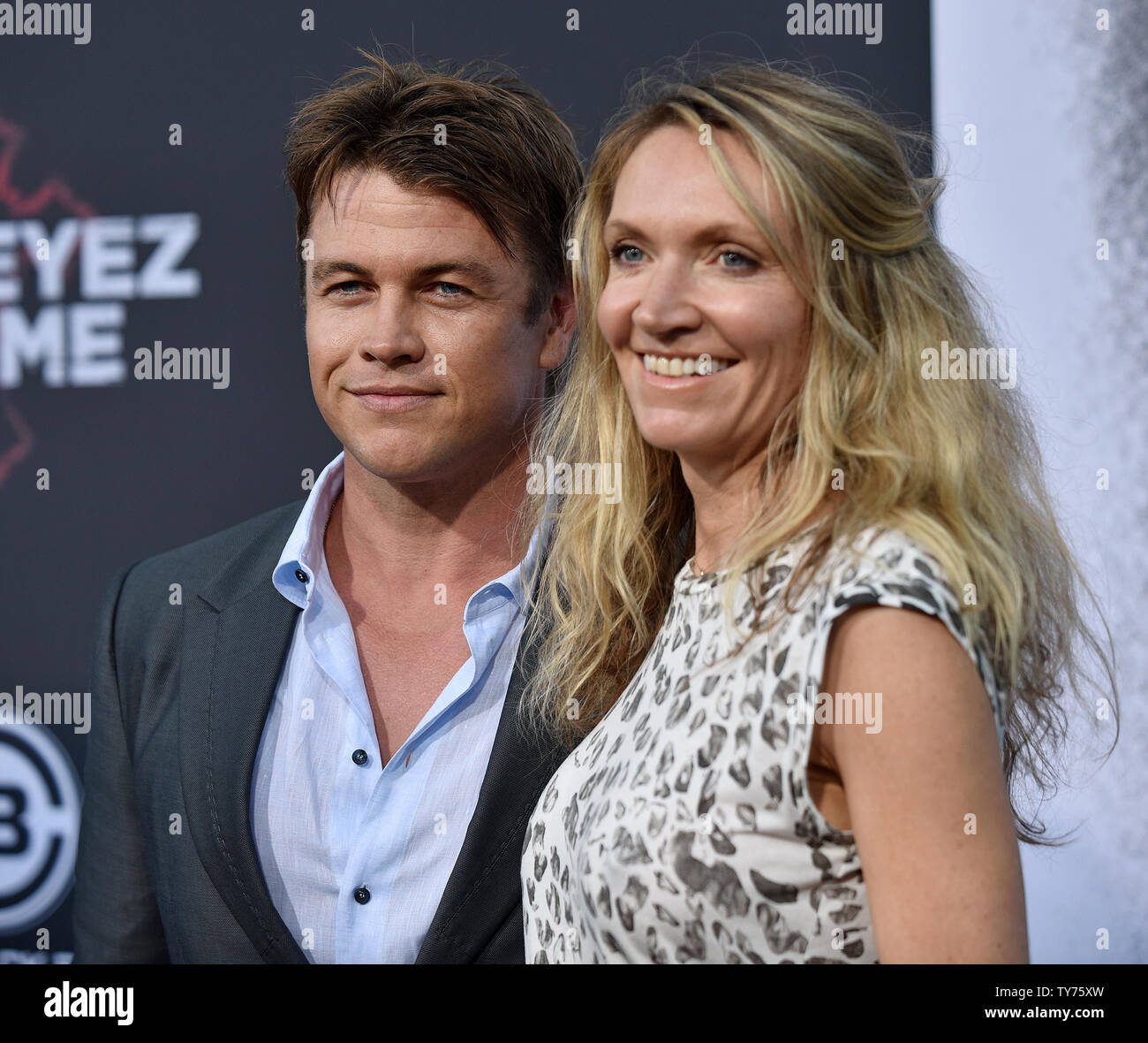 Luke Hemsworth and his wife Samantha arrive for the premiere of 'All ...