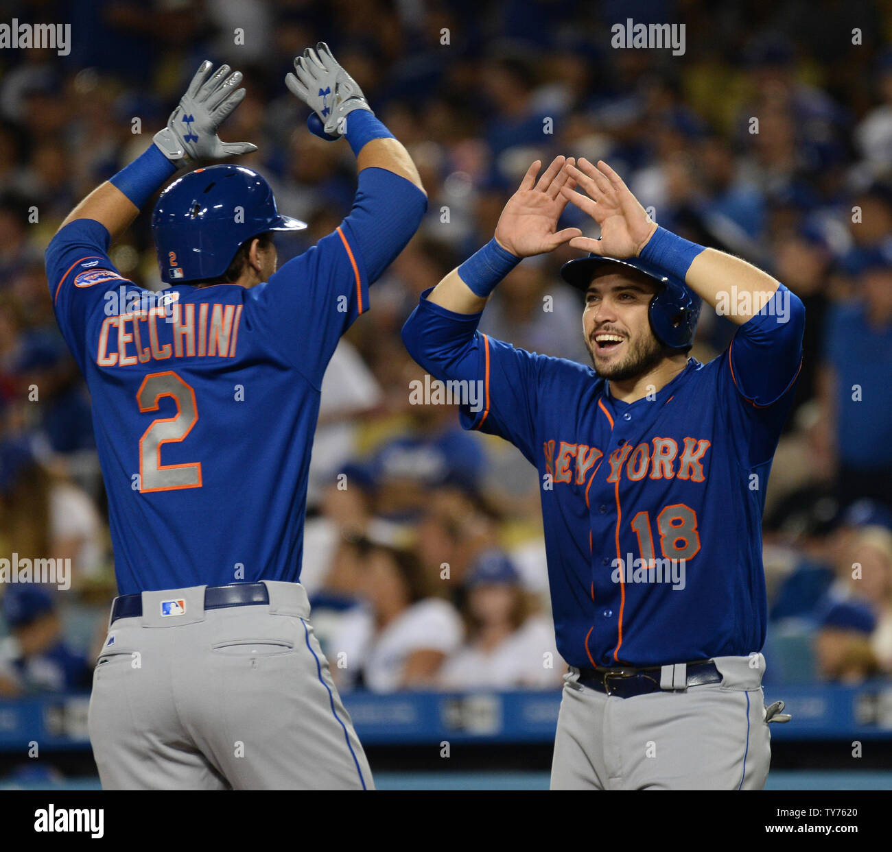 New York Mets' Travis d'Artaud celebrates with teammate Gavin Cecchini ...