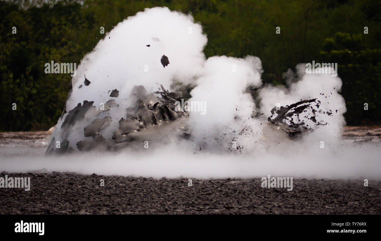 mud volcano with bursting bubble bledug kuwu. volcanic plateau with ...