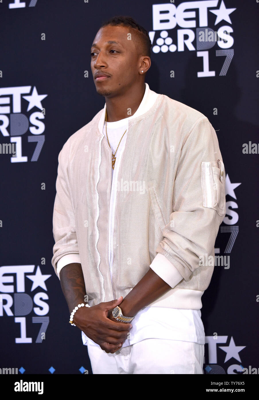 Hip-hop artist Lacrae appears backstage during the 17th annual BET ...