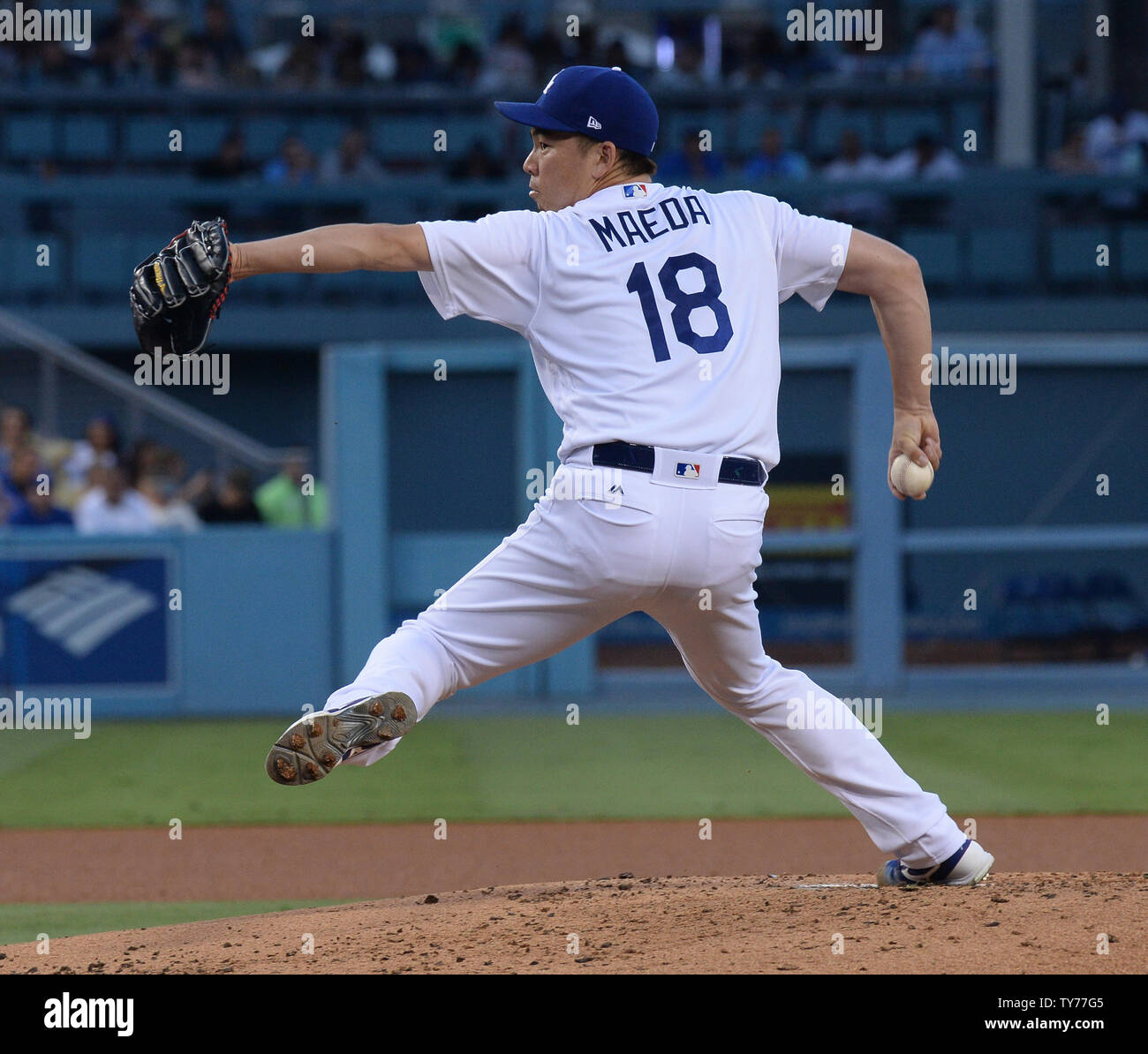 Los Angeles Dodgers' starting pitcher Kenta Maeda delivers in the ...