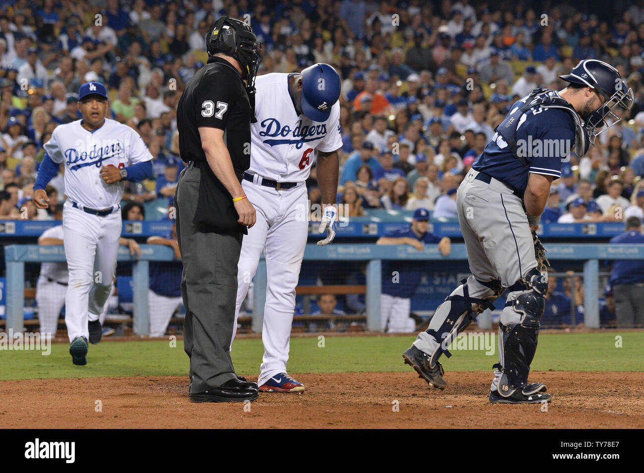 Los Angeles Dodgers' Yasiel Puig questions the strike call by umpire ...