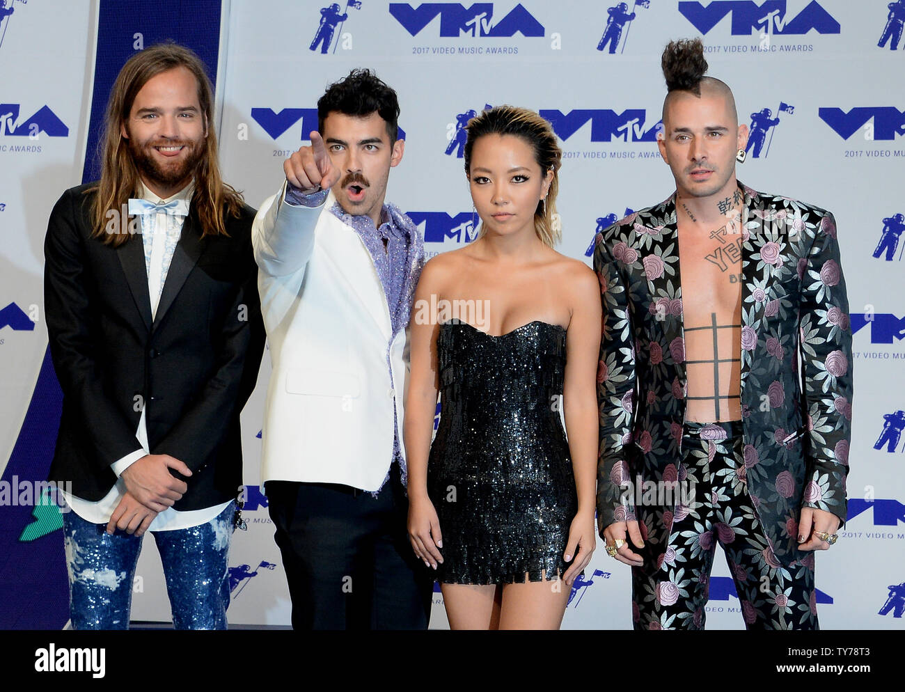 (L-R) Jack Lawless, Joe Jonas, JinJoo Lee and Cole Whittle of DNCE ...