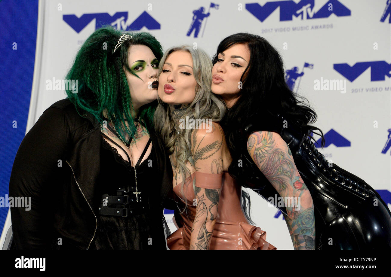 (L-R) Kelly Doty, Ryan Ashley, and Nikki Simpson arrive for the 34th ...