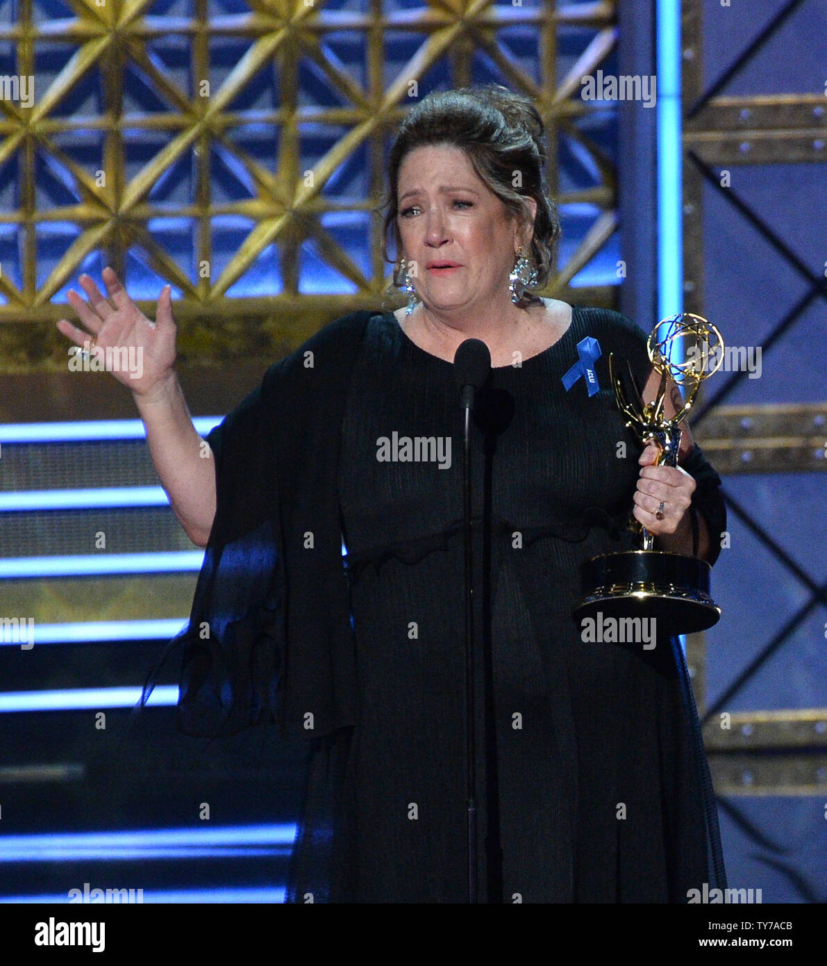 Actor Ann Dowd accepts the award for Outstanding Supporting Actress in ...