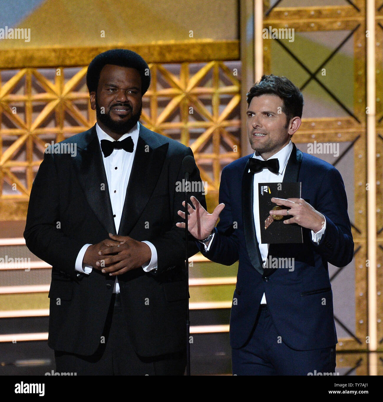 Actors Craig Robinson and Adam Scott onstage during the 69th annual Primetime Emmy Awards at ...