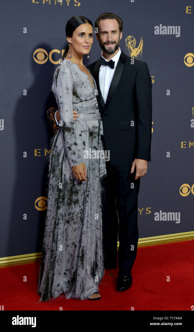 Actors Maria Dolores Dieguez (L) and Joseph Fiennes arrive for the 69th ...