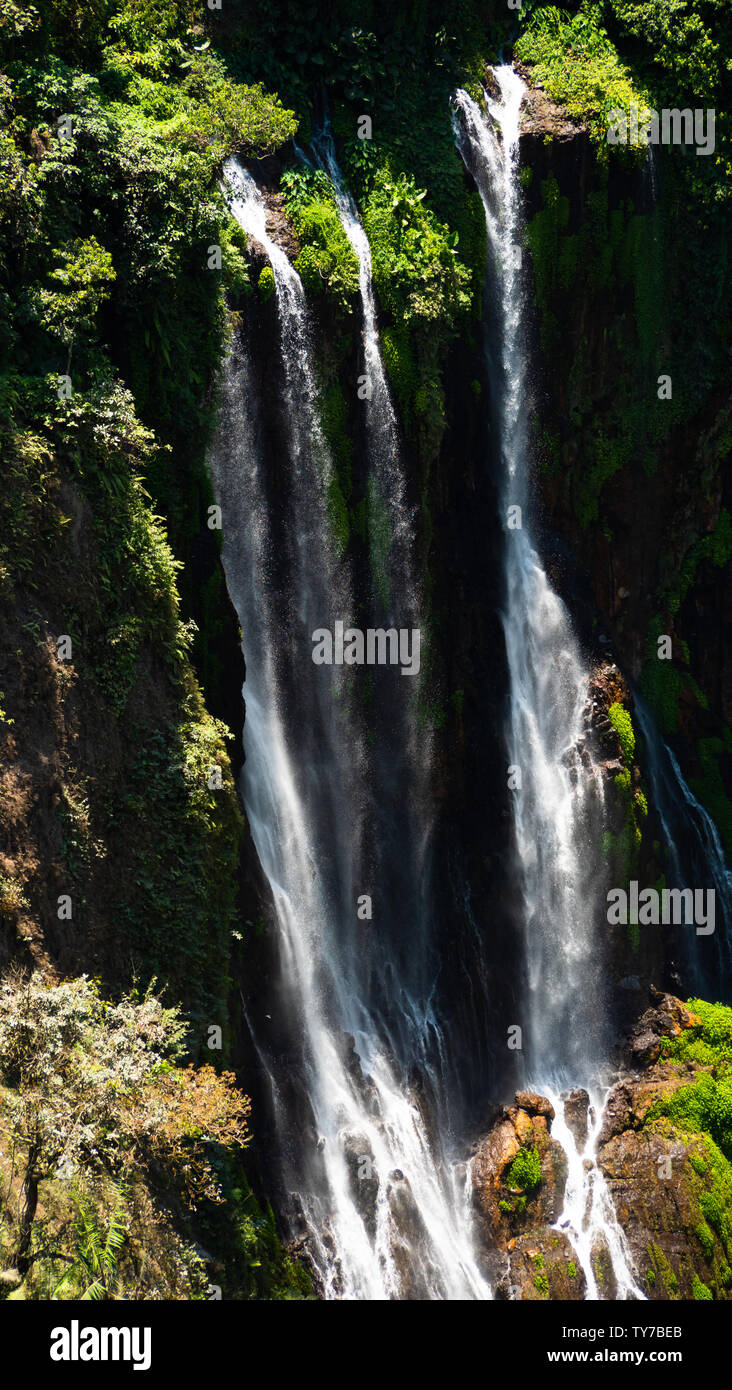 waterfall coban sewu in Java, indonesia. waterfall in tropical forest ...