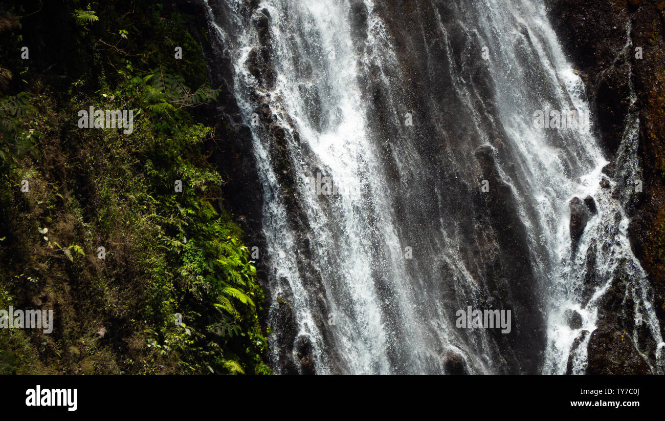 waterfall coban sewu in Java, indonesia. waterfall in tropical forest ...