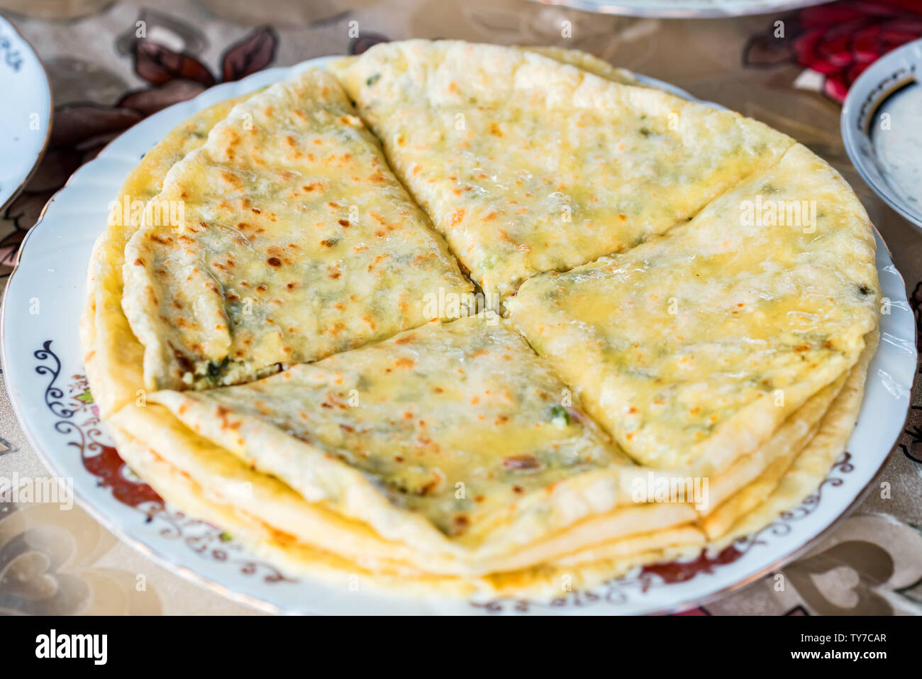 Close up pile of Caucasian khychin bread pie with stuffing Stock Photo ...