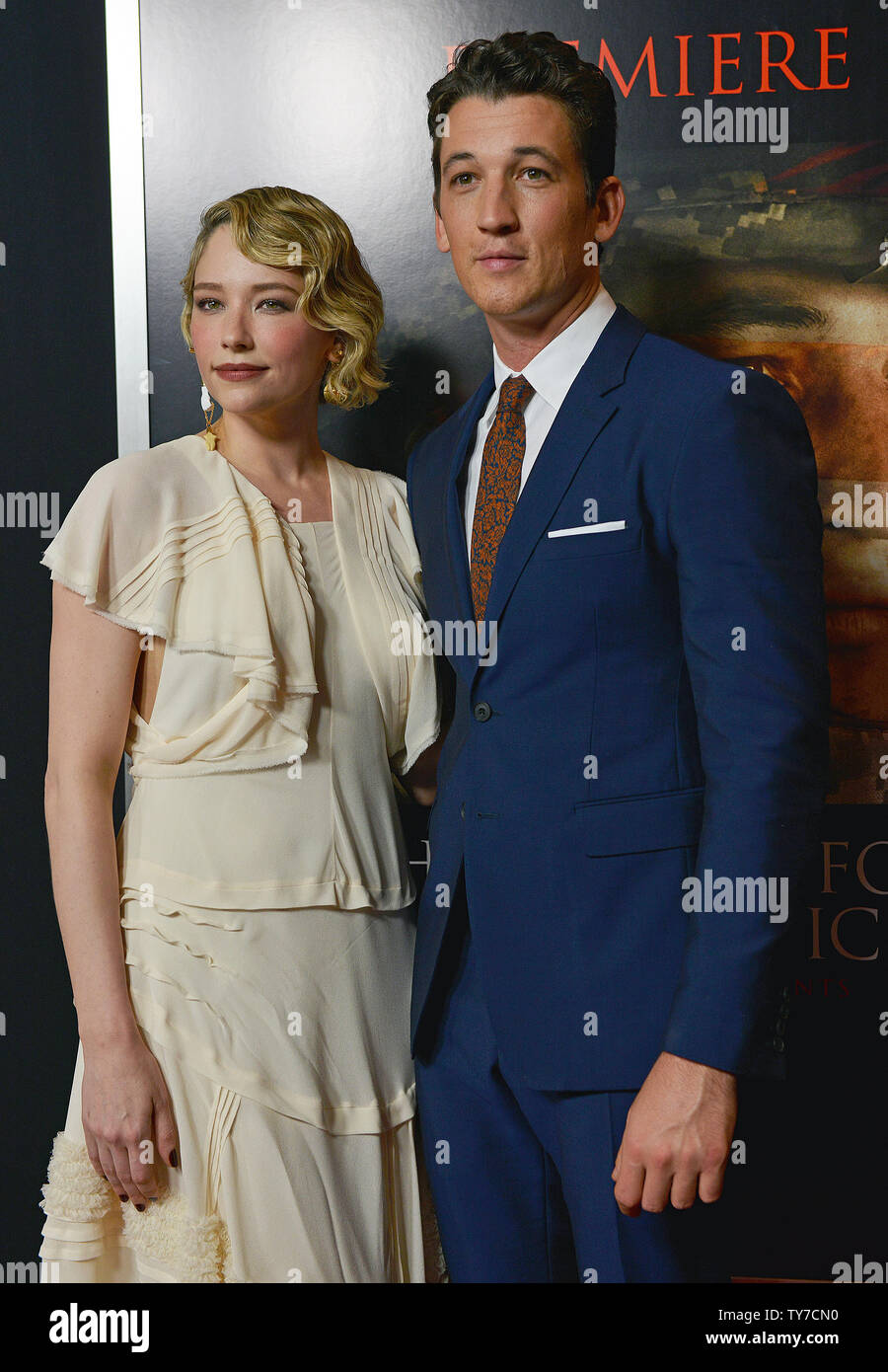 Miles Teller (R) and Haley Bennett arrive for the premiere of 'Thank ...