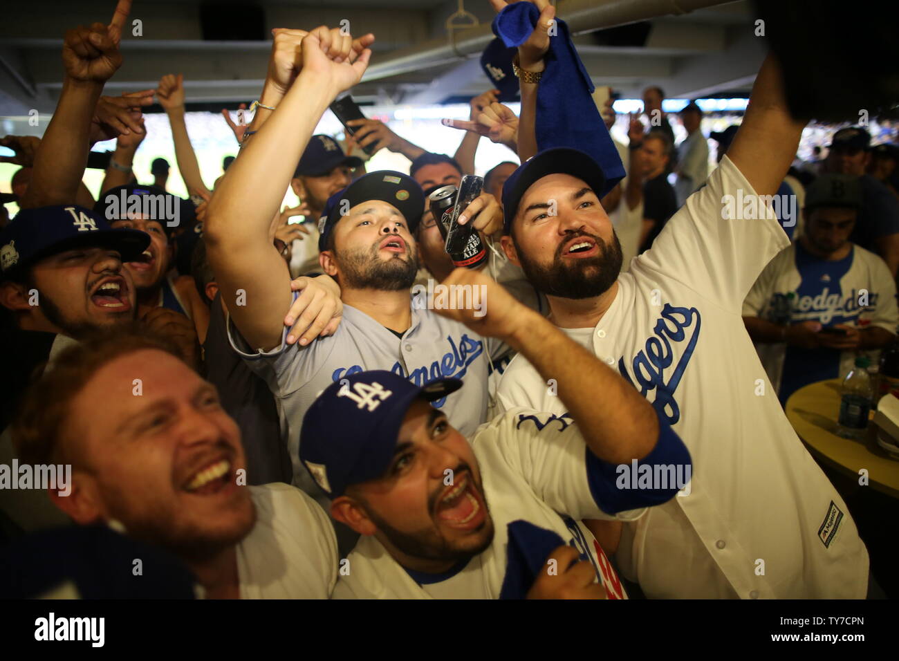 Los Angeles Dodgers fans celebrate their win in game one of the World ...