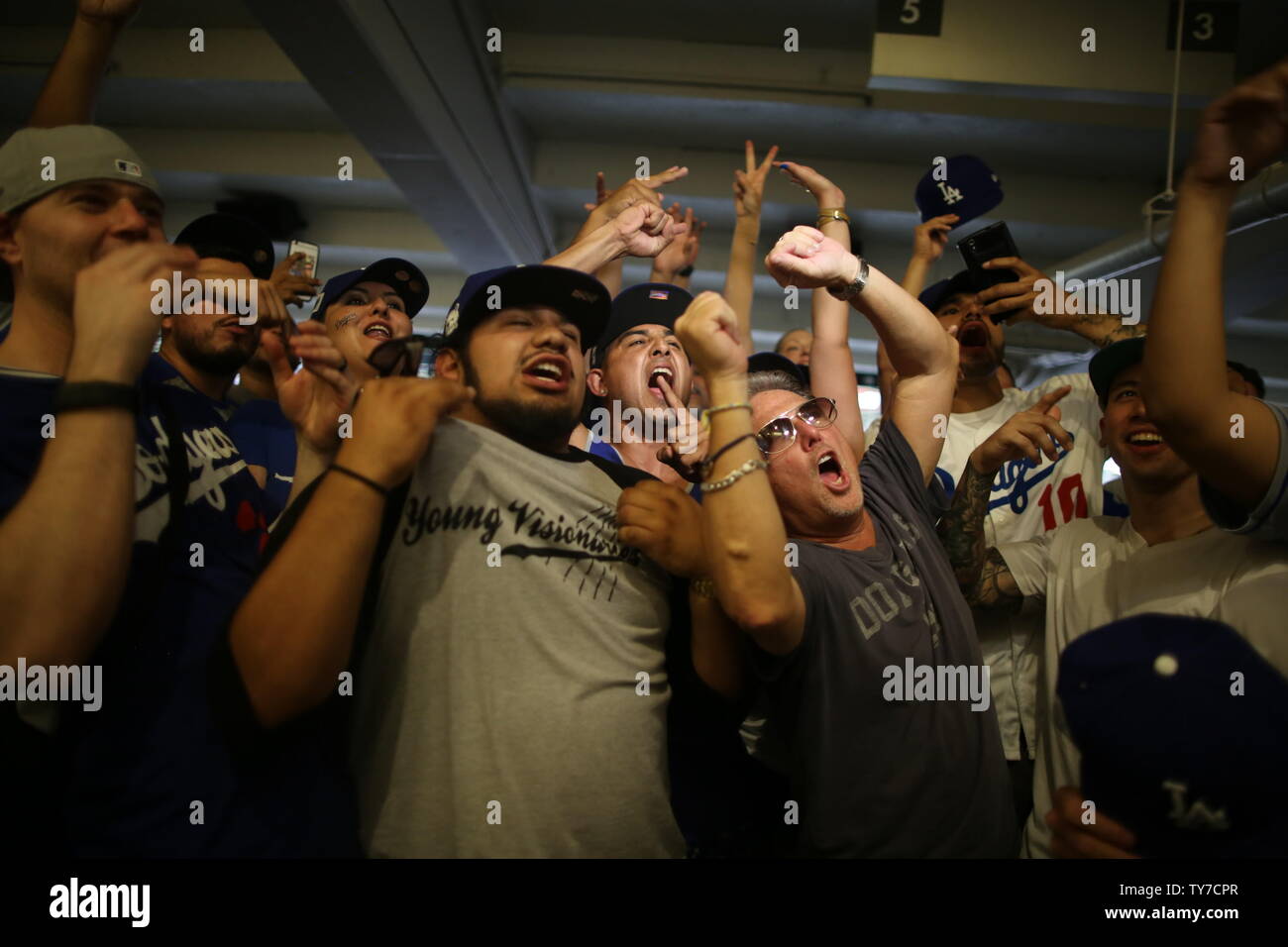 Los Angeles Dodgers fans celebrate their win in game one of the World ...