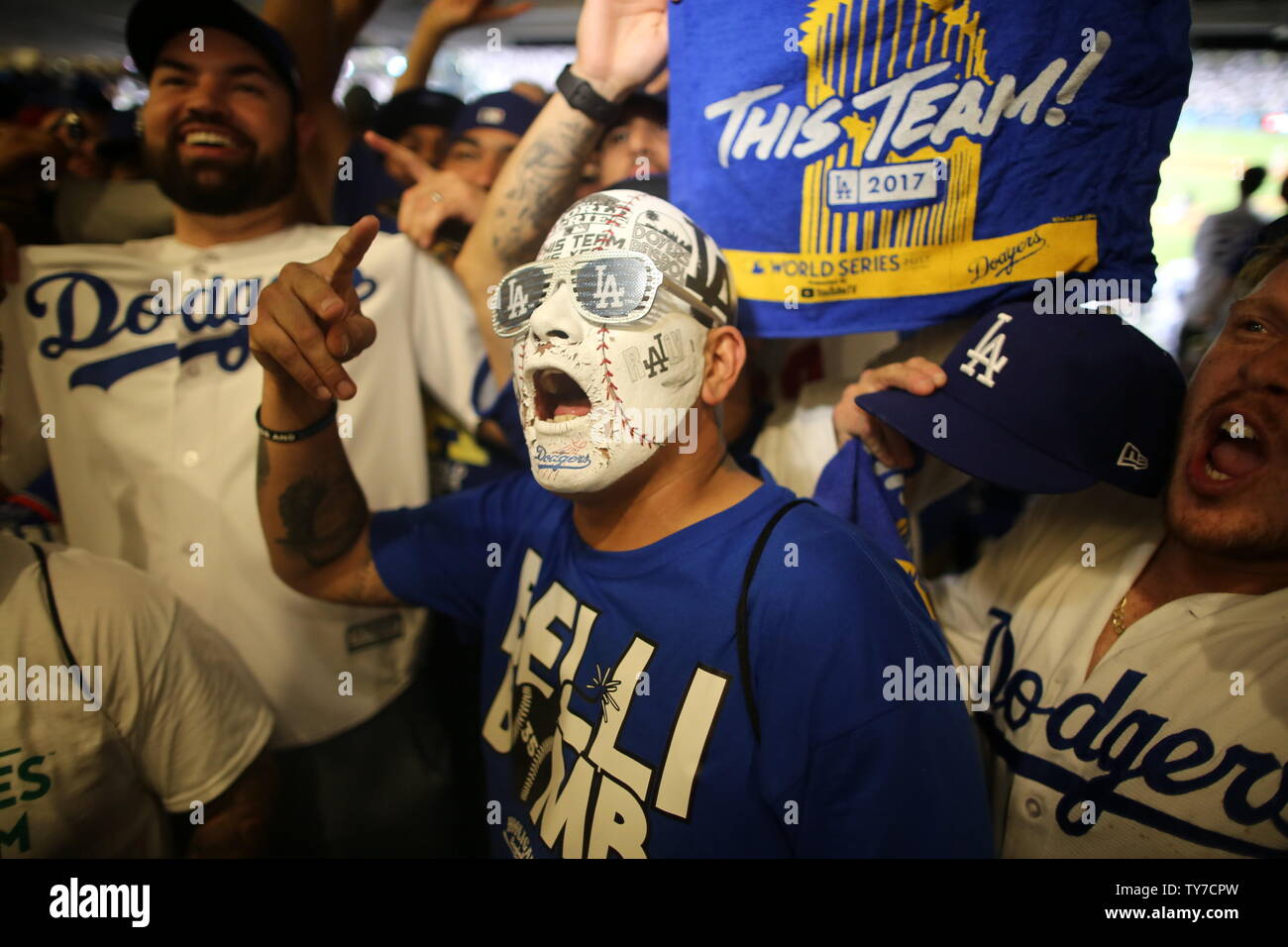 Los Angeles Dodgers fans celebrate their win in game one of the World ...