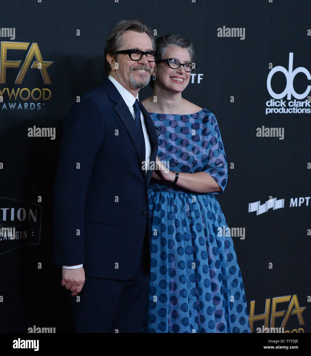 Honoree Gary Oldman and his wife, writer and art curator Gisele Schmidt ...