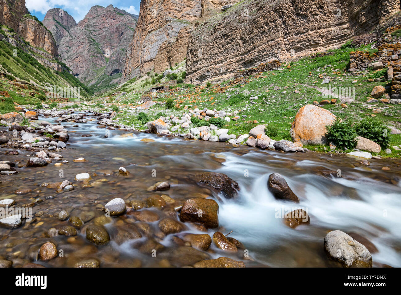 Beautiful peaceful view of water in mountain river. Slow shutter speed ...