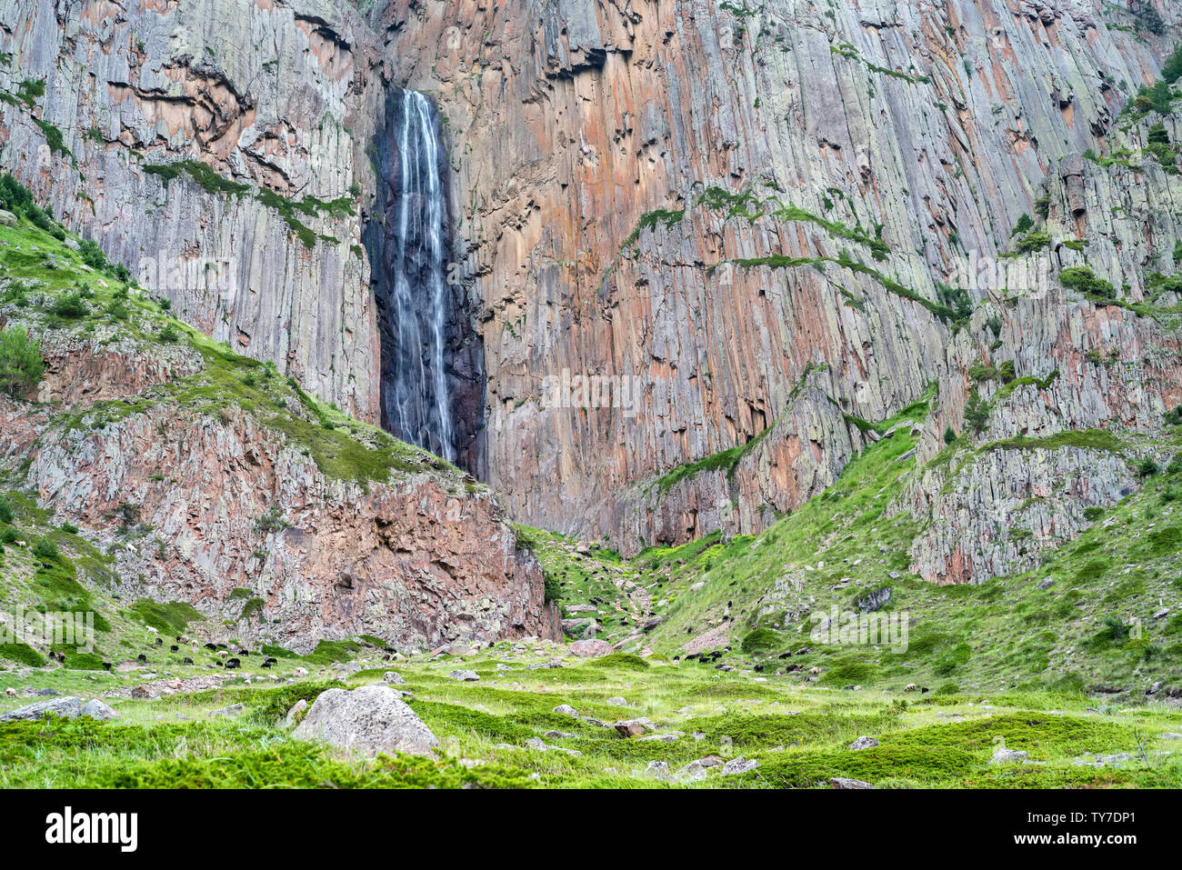 Summer landscape with mountain waterfall between two rocks Stock Photo ...