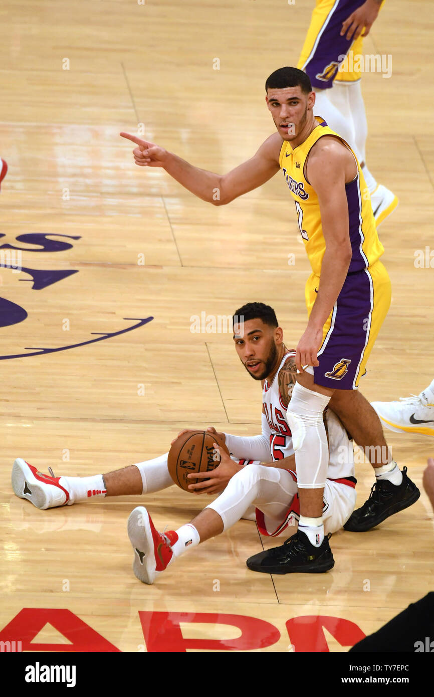 Lakers guard Lonzo Ball stands over Bulls Denzel Valentine both waiting ...