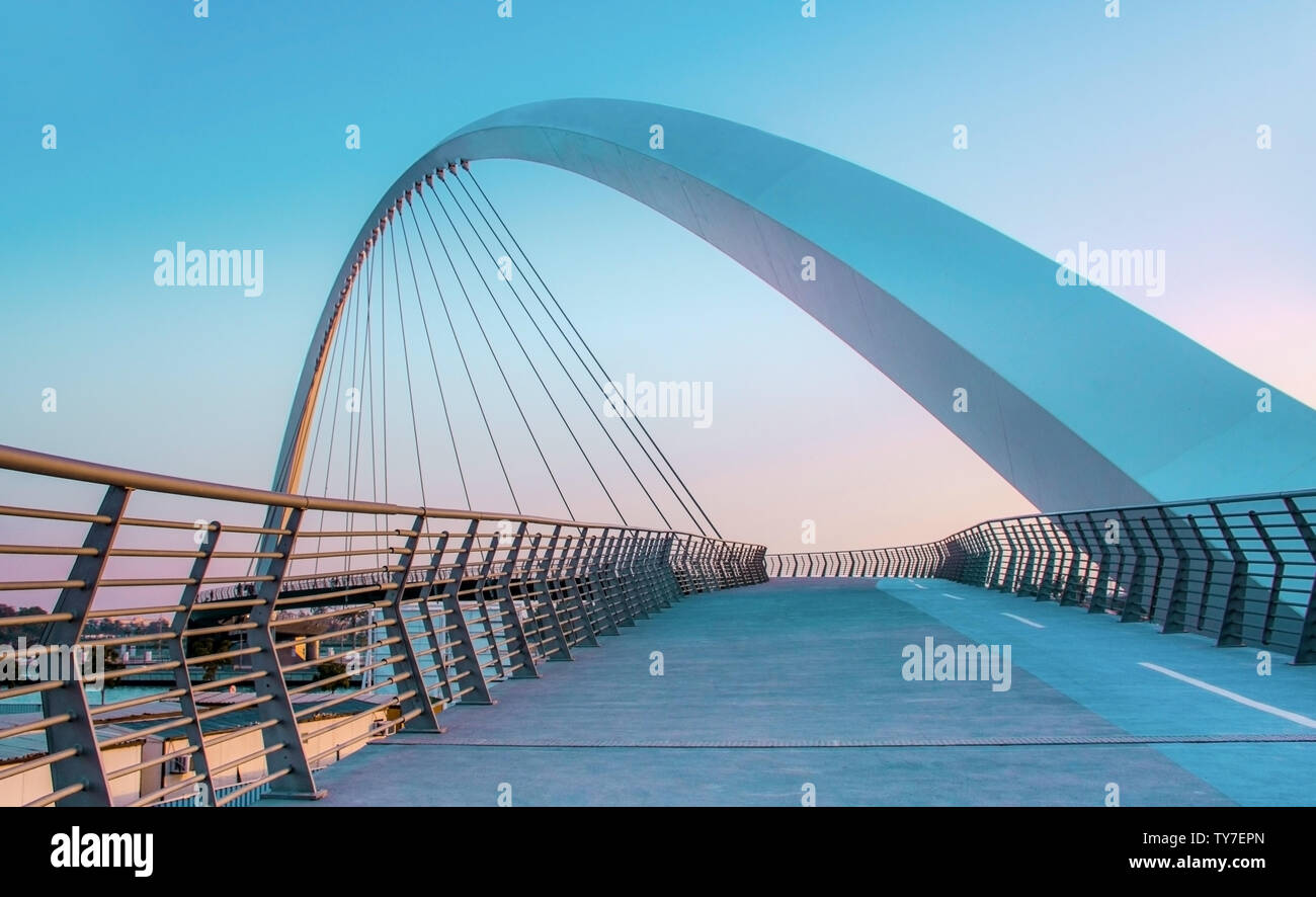 Modern Architecture Dubai Water canal Tolerance Bridge, colorful sunset ...