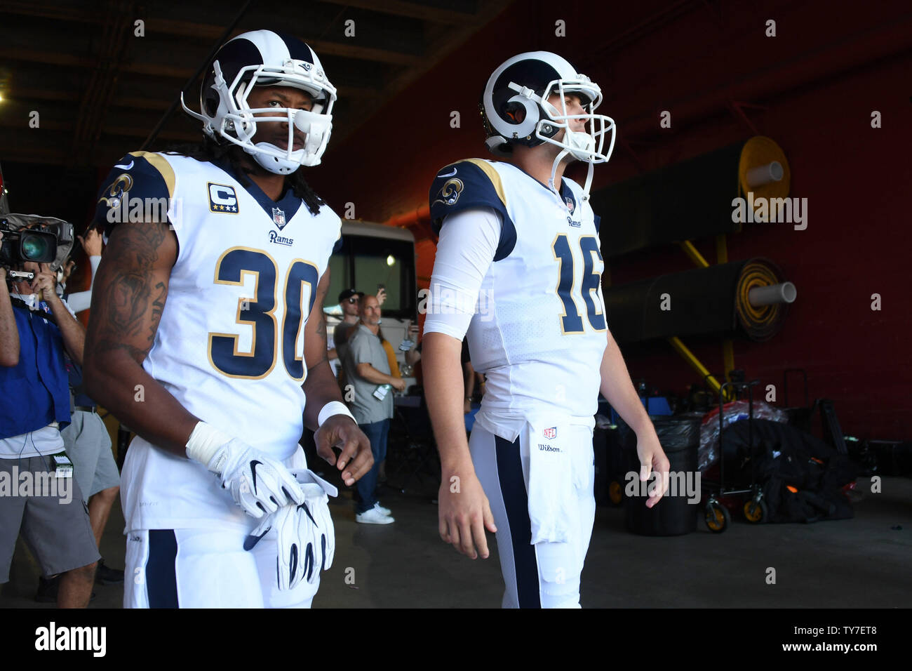 Rams running back Todd Gurley II (30) and quarterback Jared Goff head ...