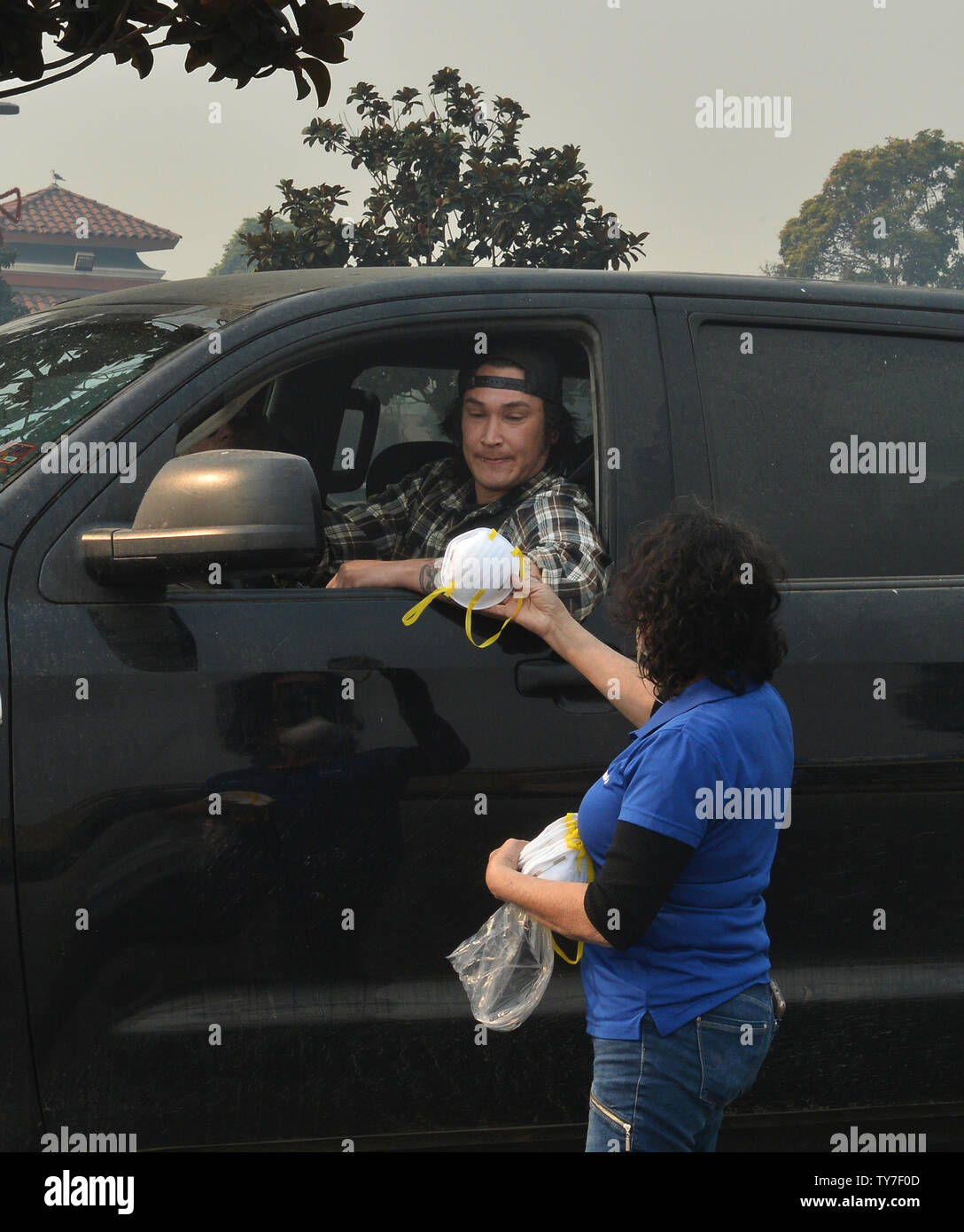 Volunteers Dispense Free Breathing Masks In Carpinteria California On
