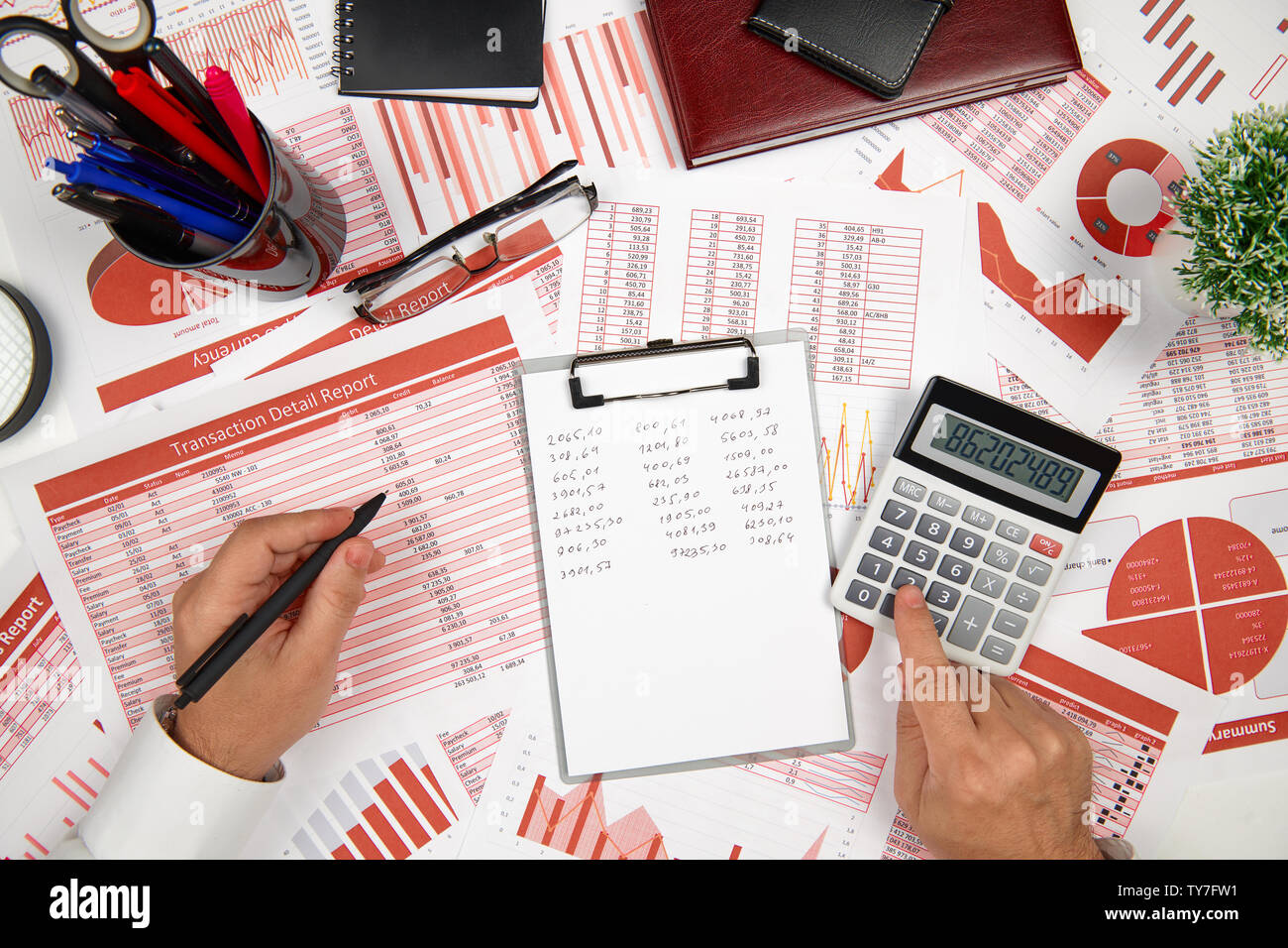 Business reports, data tables and charts - directly above view of ...