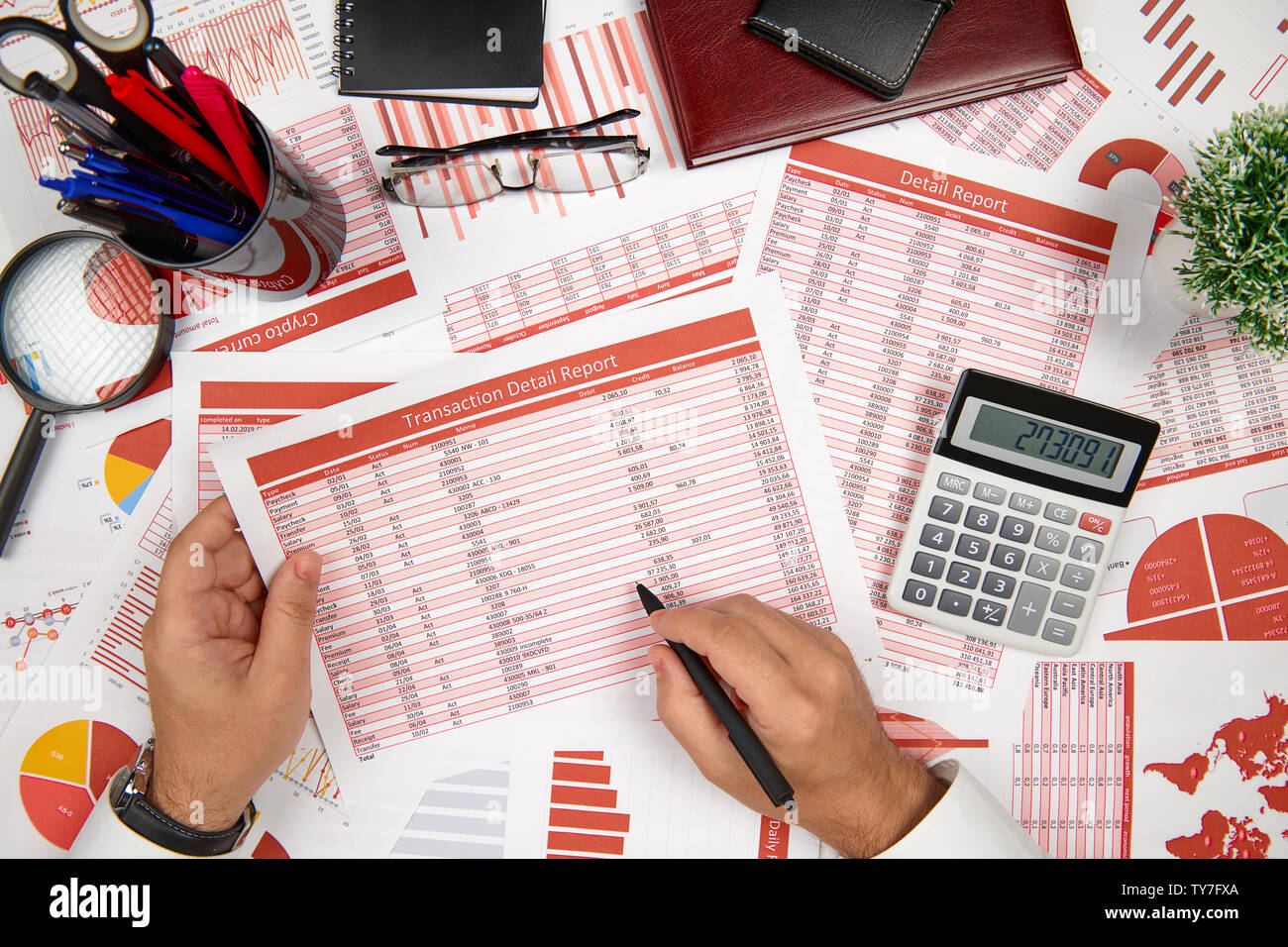 Business reports, blank paper sheet, data tables and charts - directly ...