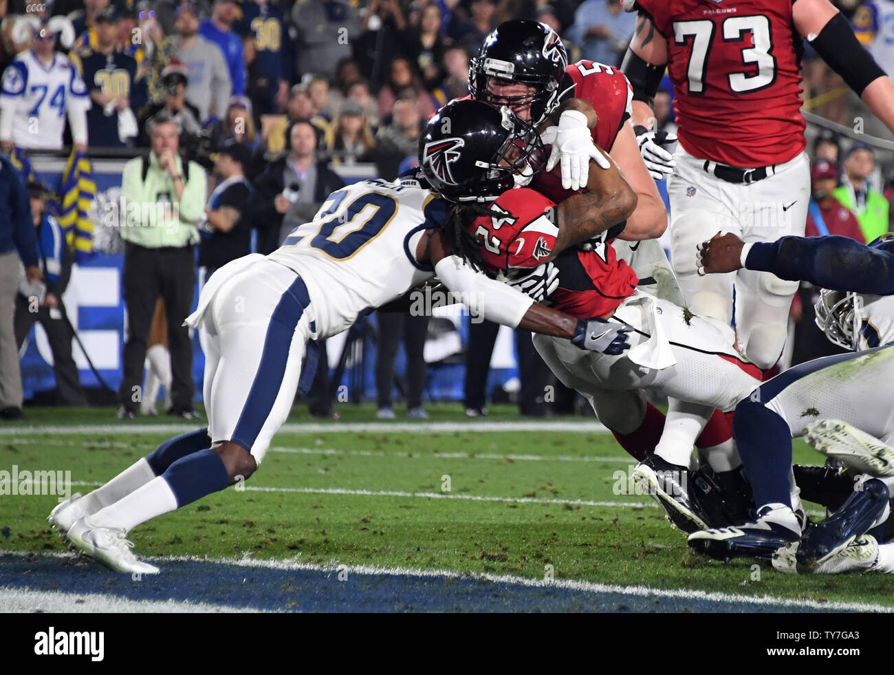Falcons running back DeVonta Freeman scores past Rams Lamarcus Joyner ...