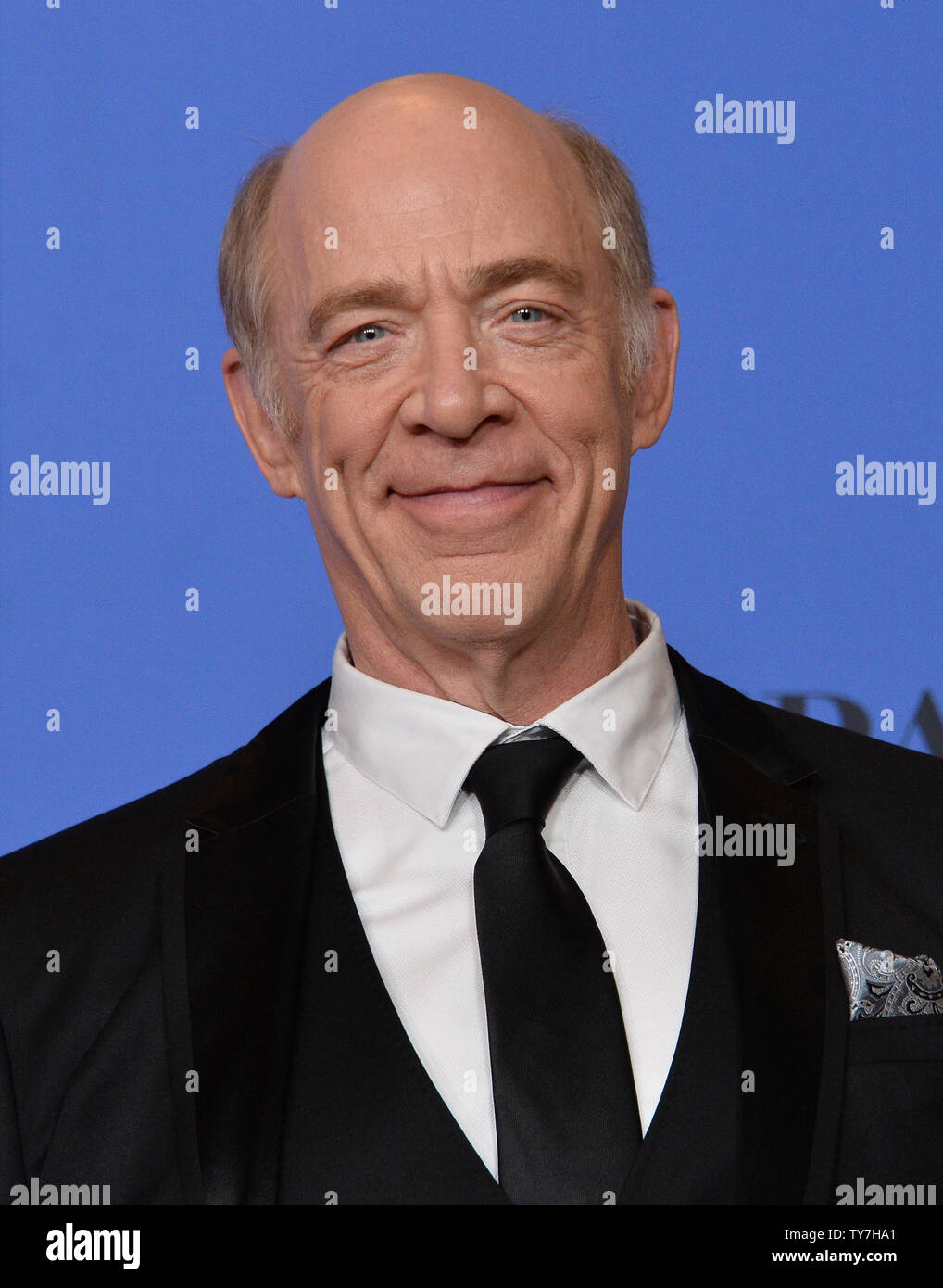 Actor J. K. Simmons appears backstage during the 75th annual Golden ...