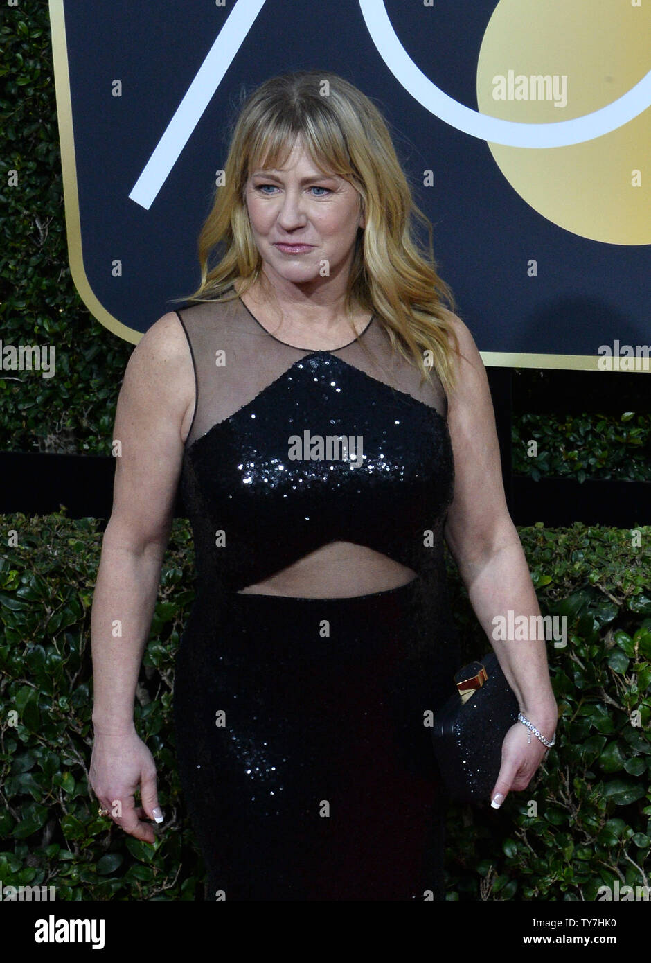Figure Skater Tonya Harding attends the 75th annual Golden Globe Awards ...