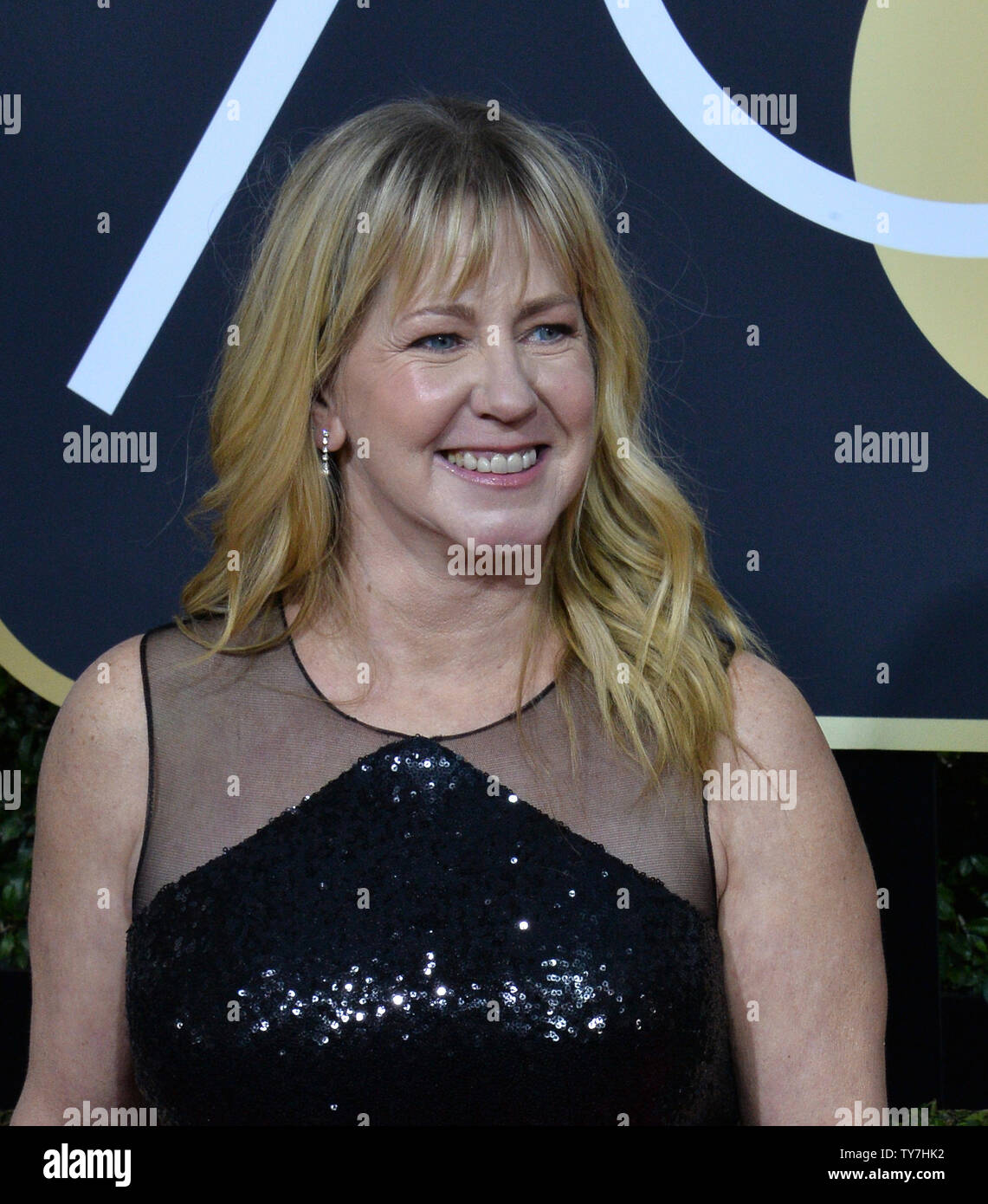 Figure Skater Tonya Harding attends the 75th annual Golden Globe Awards ...