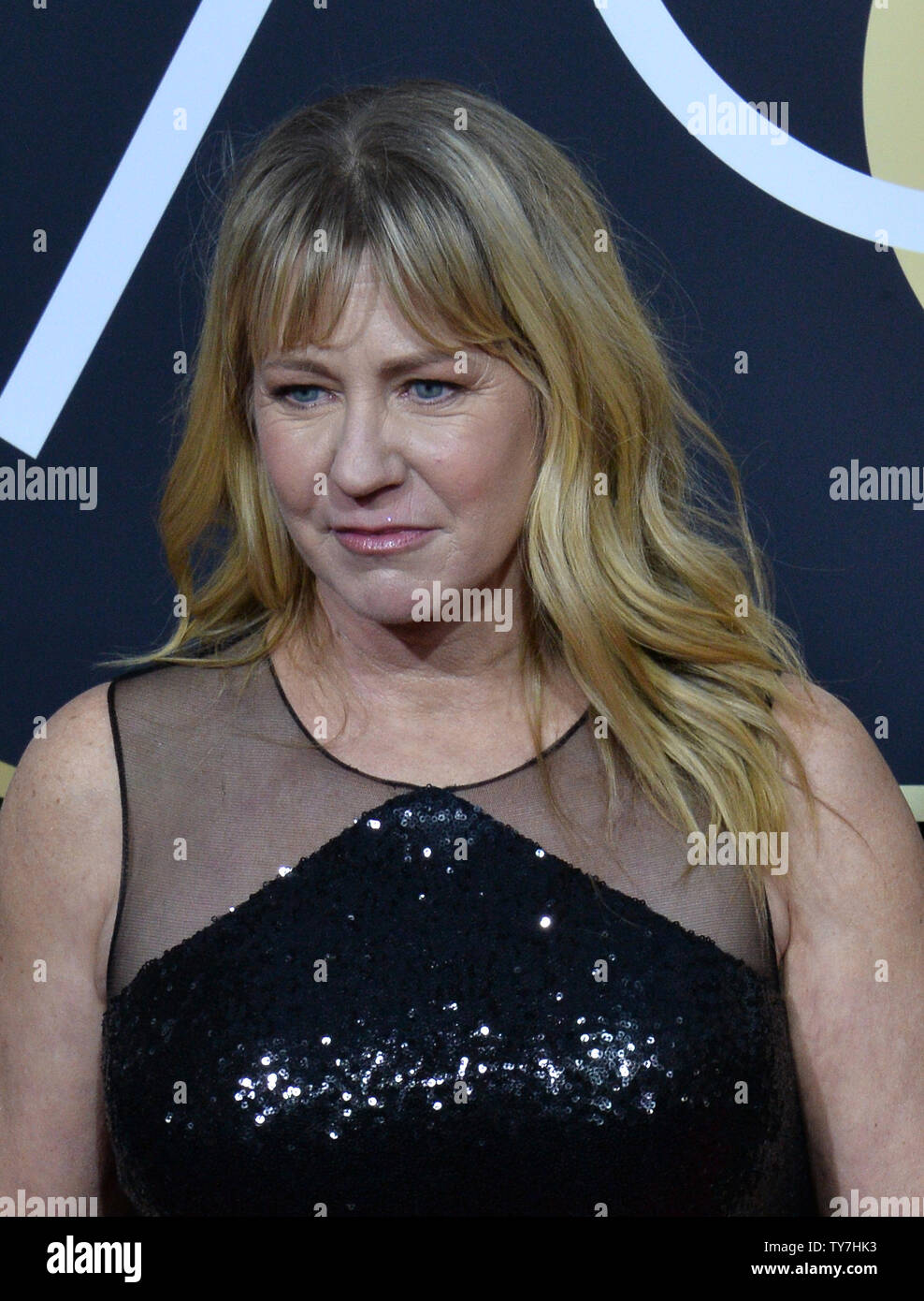 Figure Skater Tonya Harding attends the 75th annual Golden Globe Awards ...