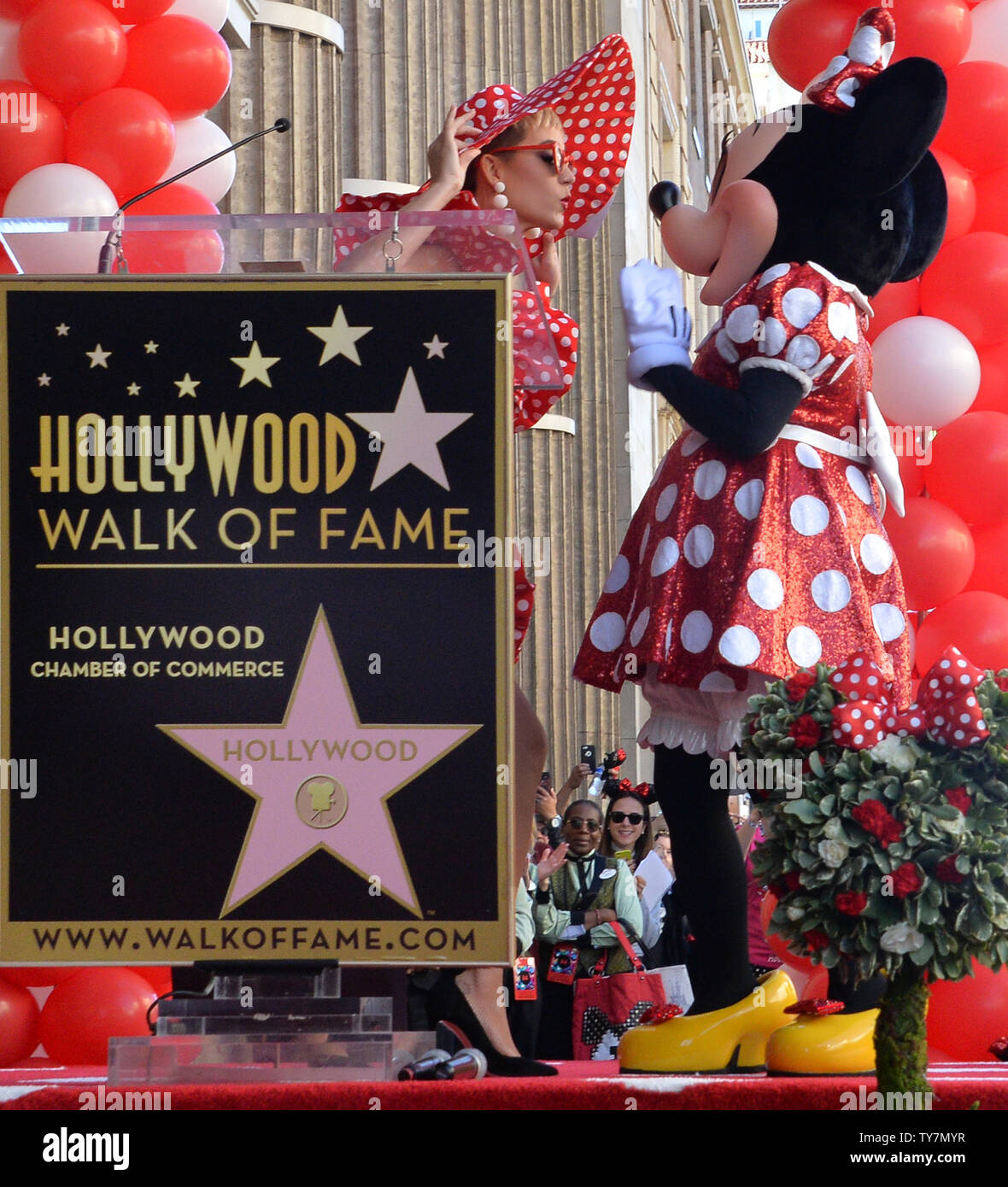 Minnie Mouse is joined by singer Katie Perry during an unveiling ...