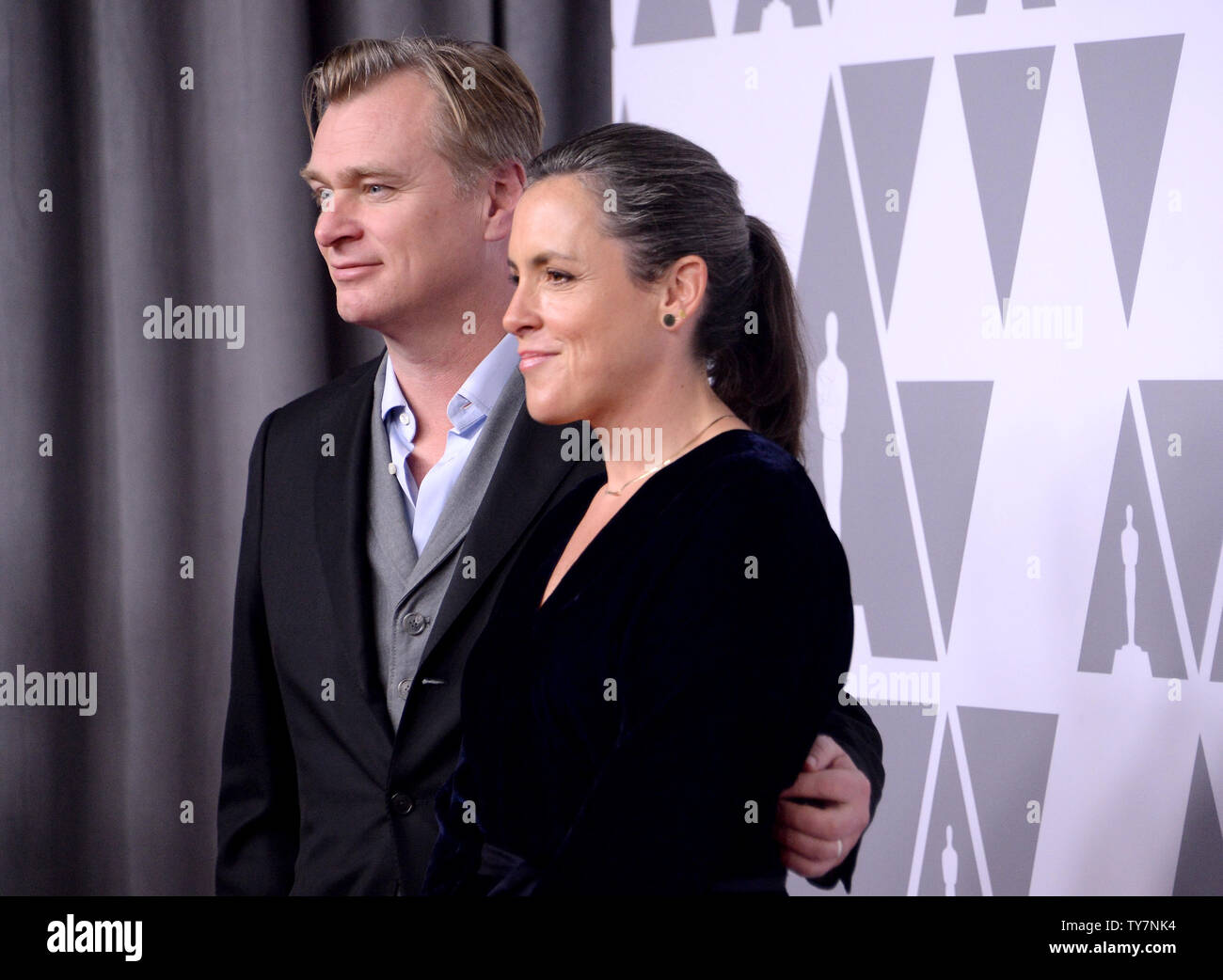 Director Christopher Nolan (L) and Producer Emma Thomas attend the 90th ...