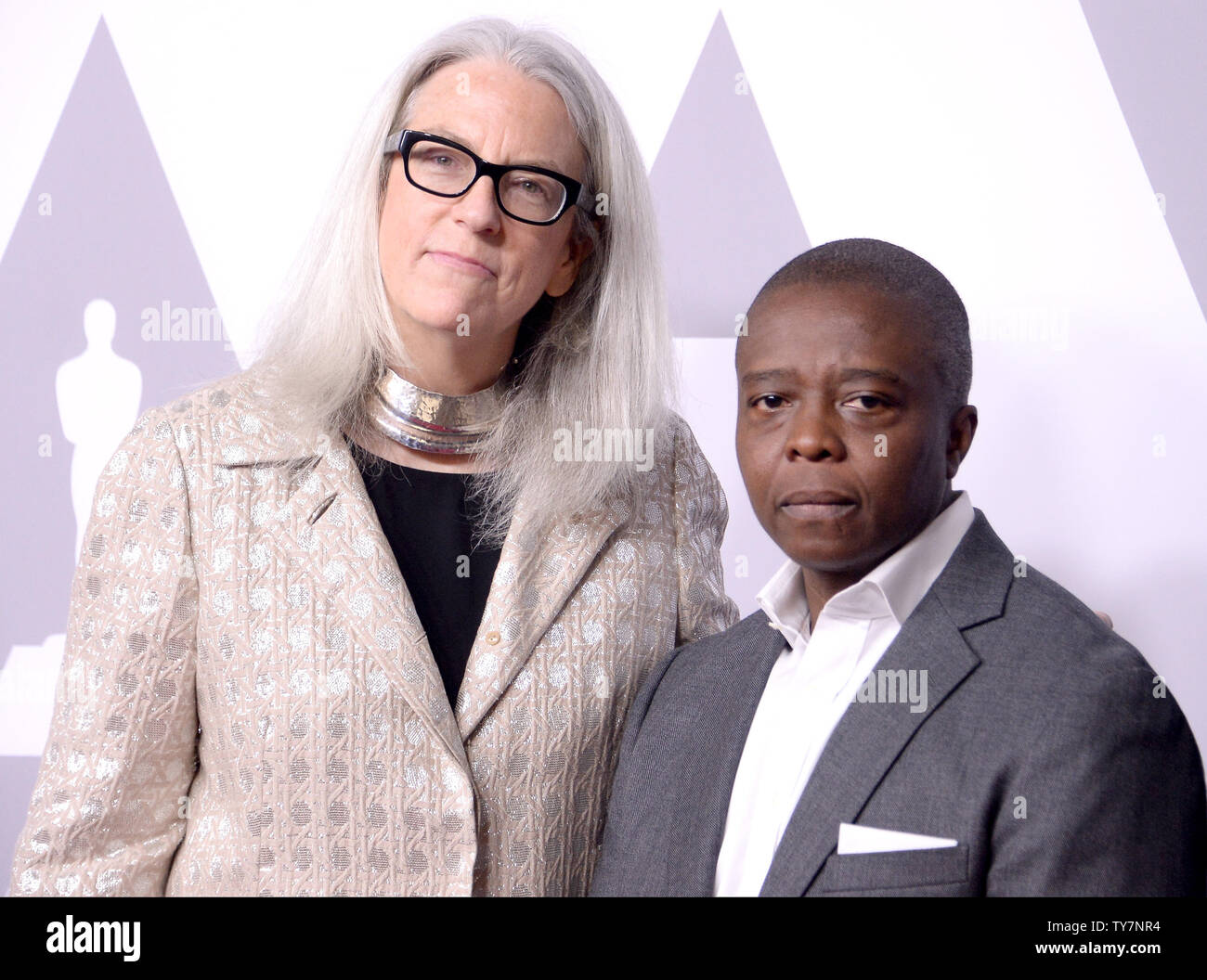 Producer Joslyn Barnes (L) and director Yance Ford attend the 90th ...