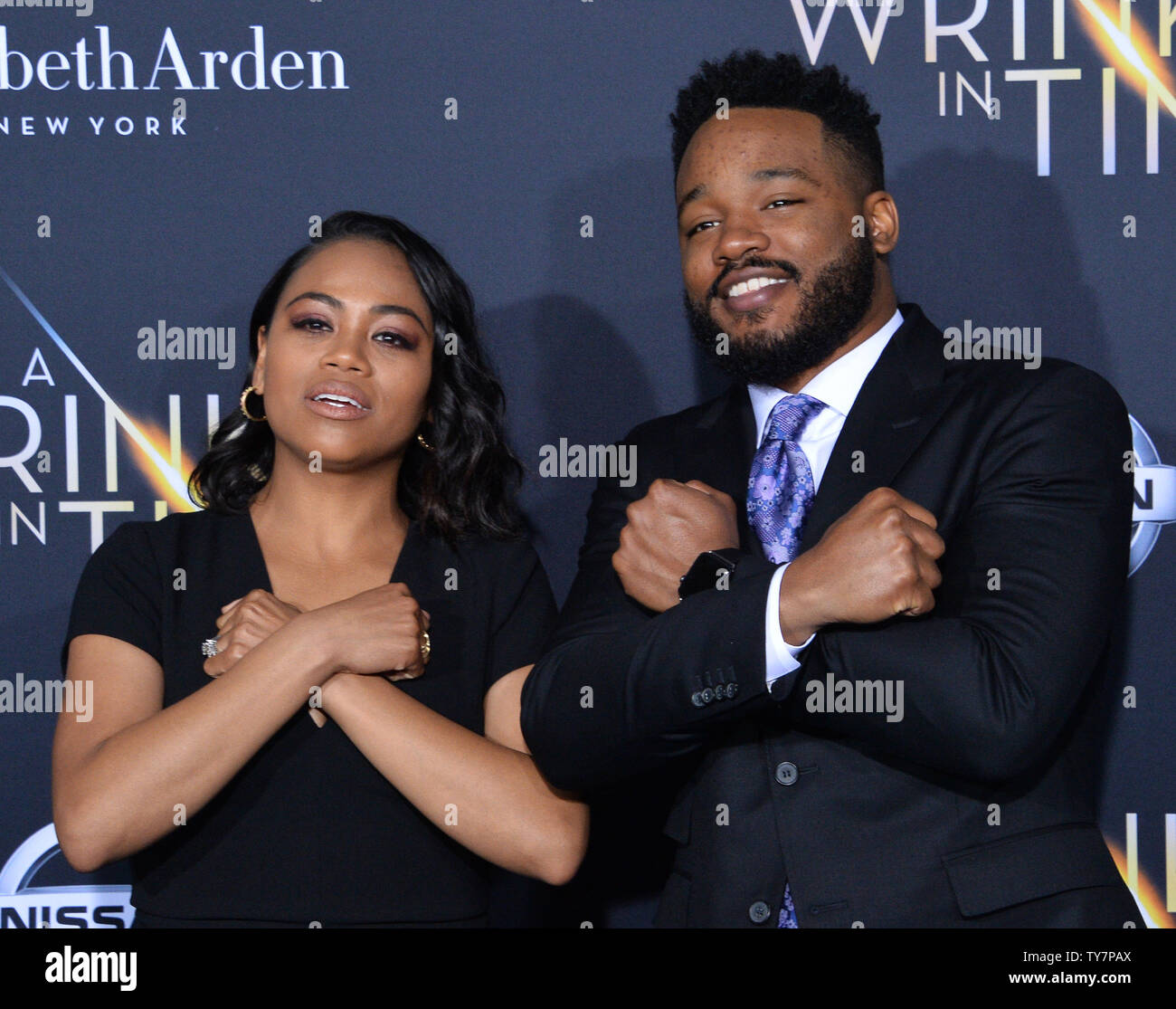 Director Ryan Coogler and his wife Zinzi Evans attend the premiere of ...