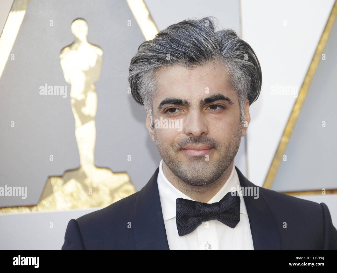Feras Fayyad arrives on the red carpet for the 90th annual Academy ...