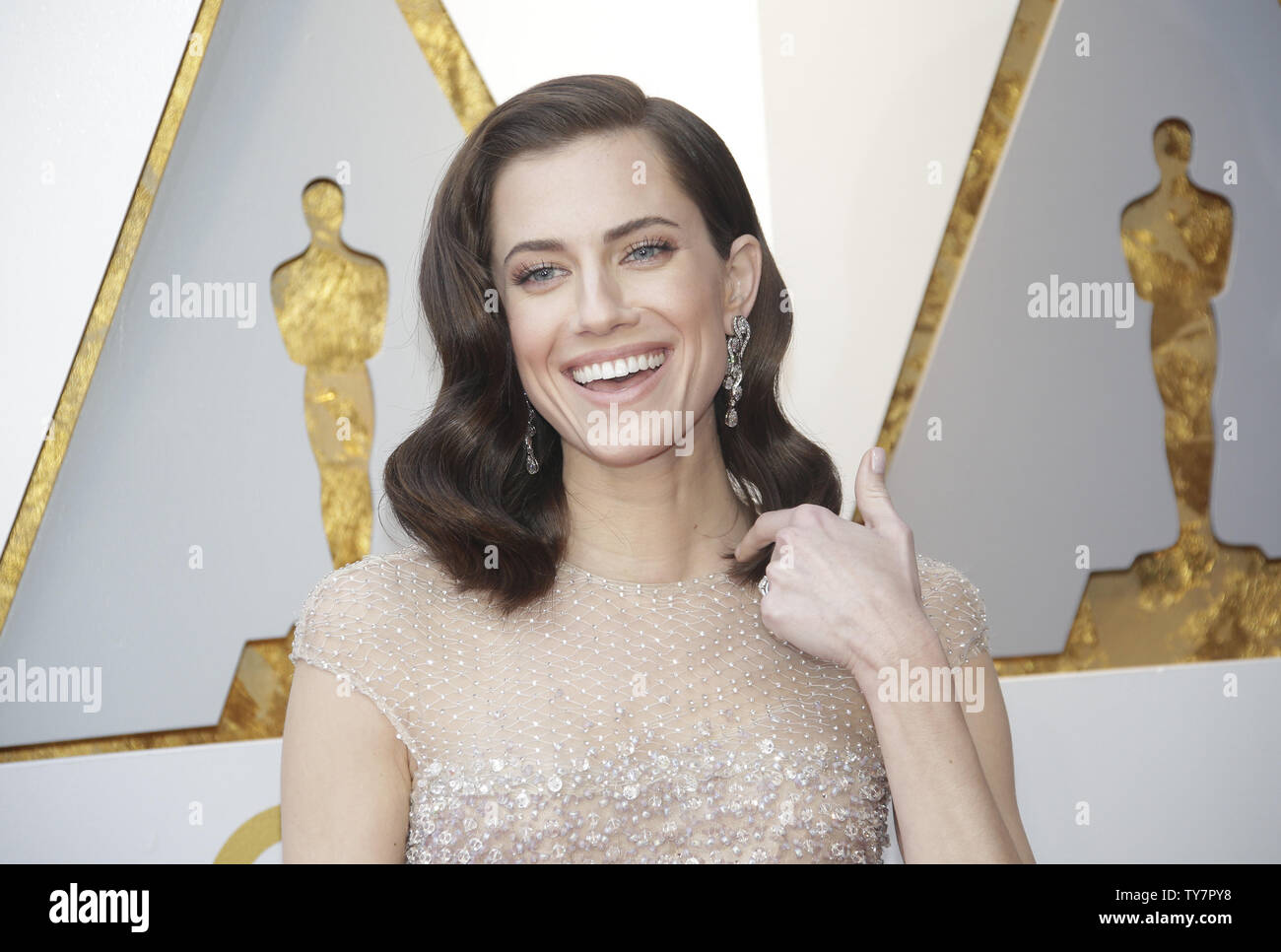 Allison Williams arrives on the red carpet for the 90th annual Academy ...