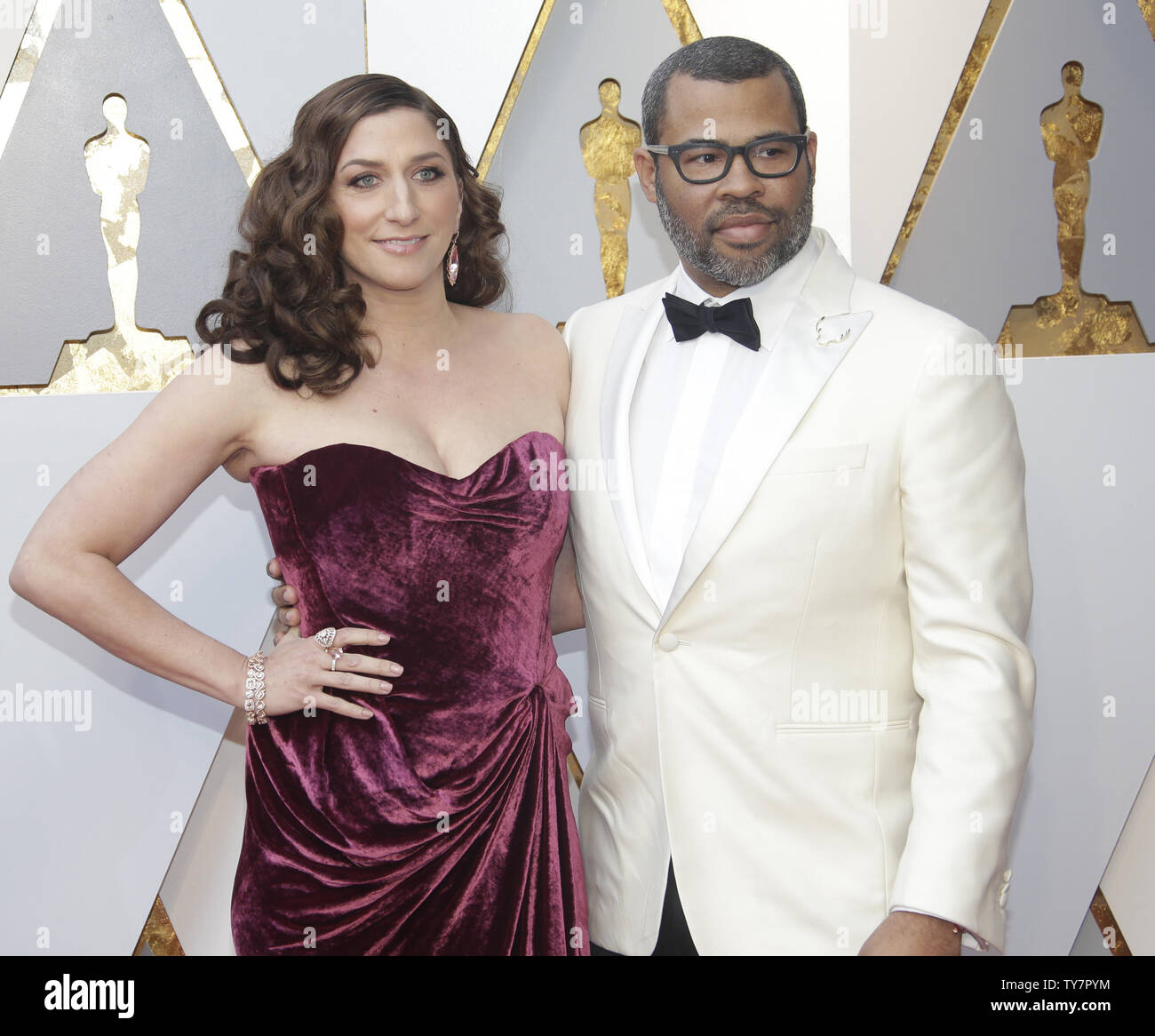 Actress Chelsea Peretti L And Director Jordan Peele Arrive On The Red