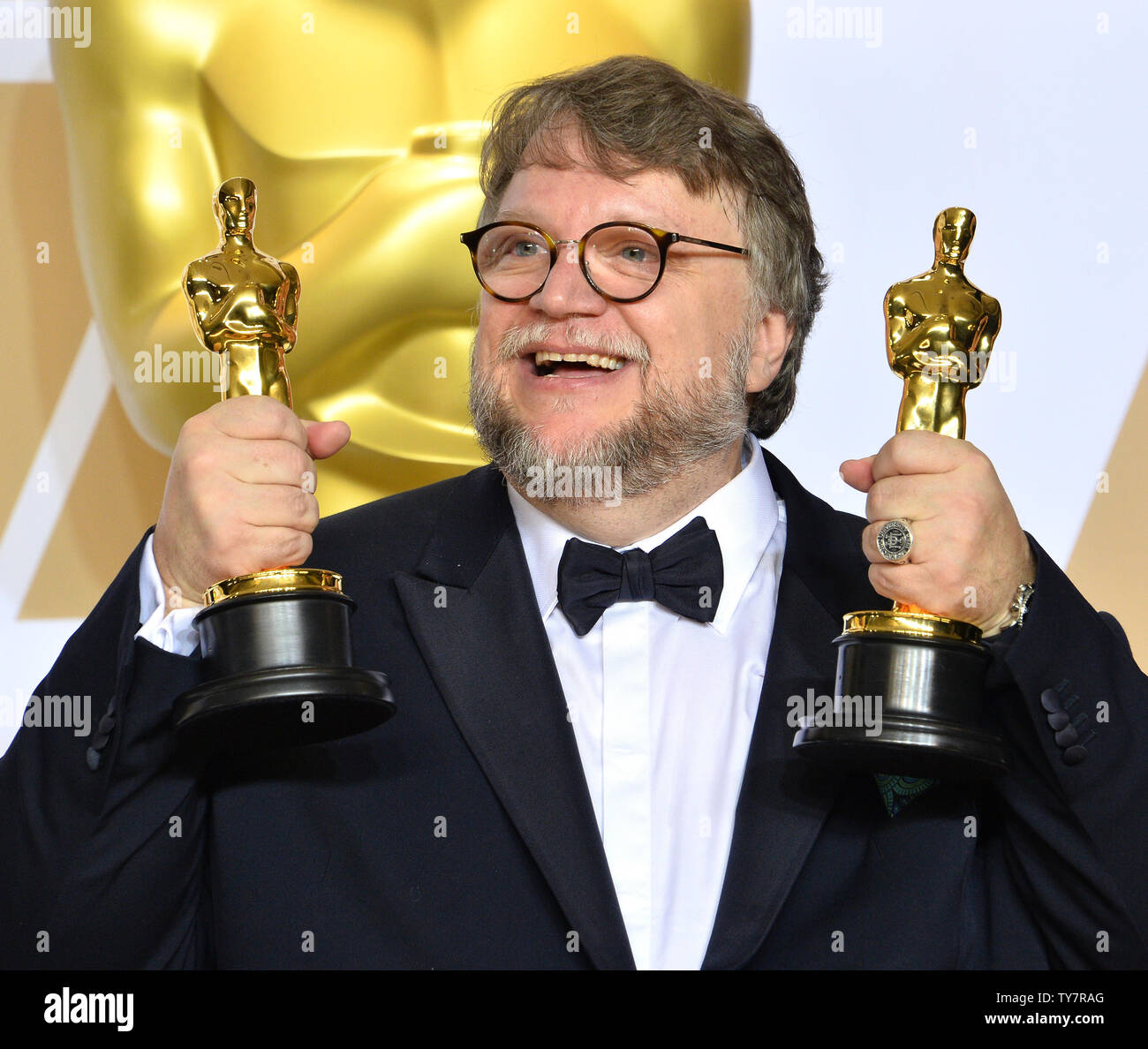 Filmmaker Guillermo del Toro, winner of the awards for Best Director ...