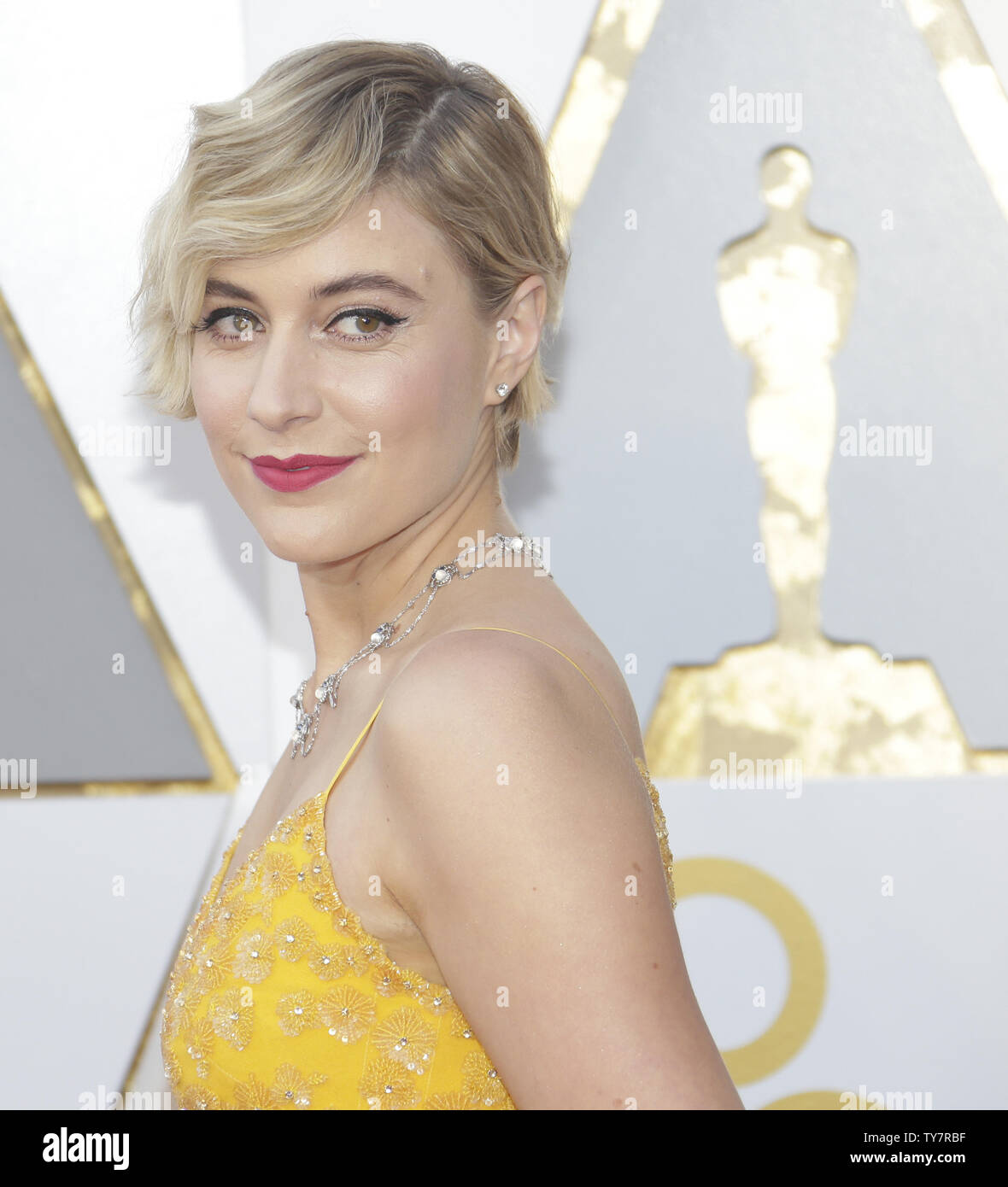 Greta Gerwig arrives on the red carpet for the 90th annual Academy ...