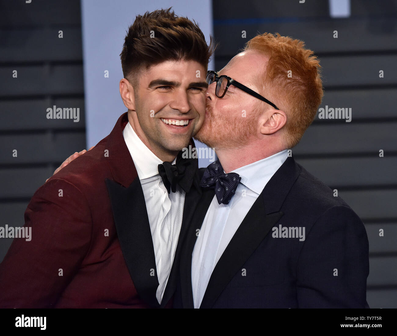 Jesse Tyler Ferguson (R) and his husband Justin Mikita arrive for the ...