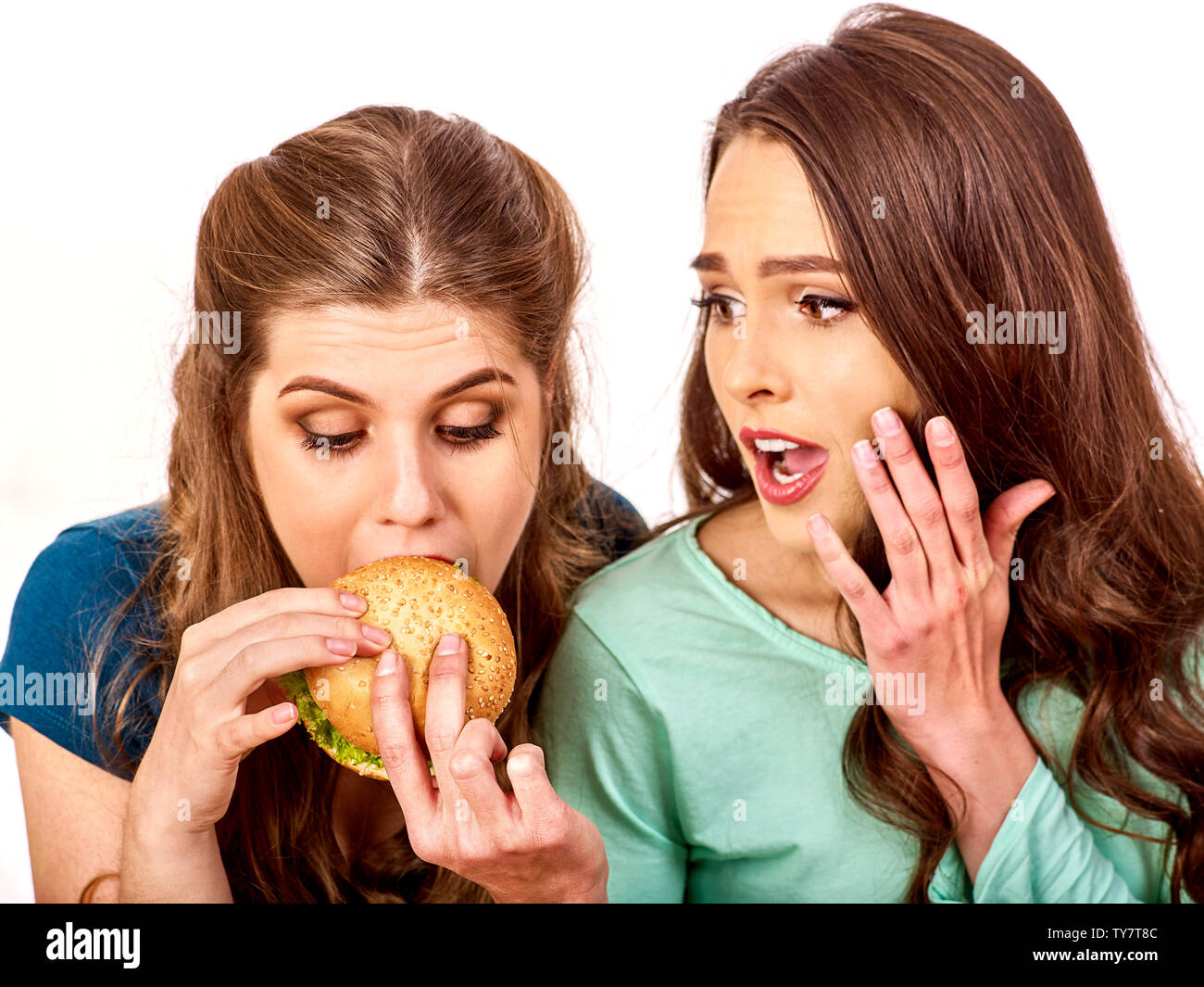 Couple eat hamburger. Friends take fast food Stock Photo - Alamy