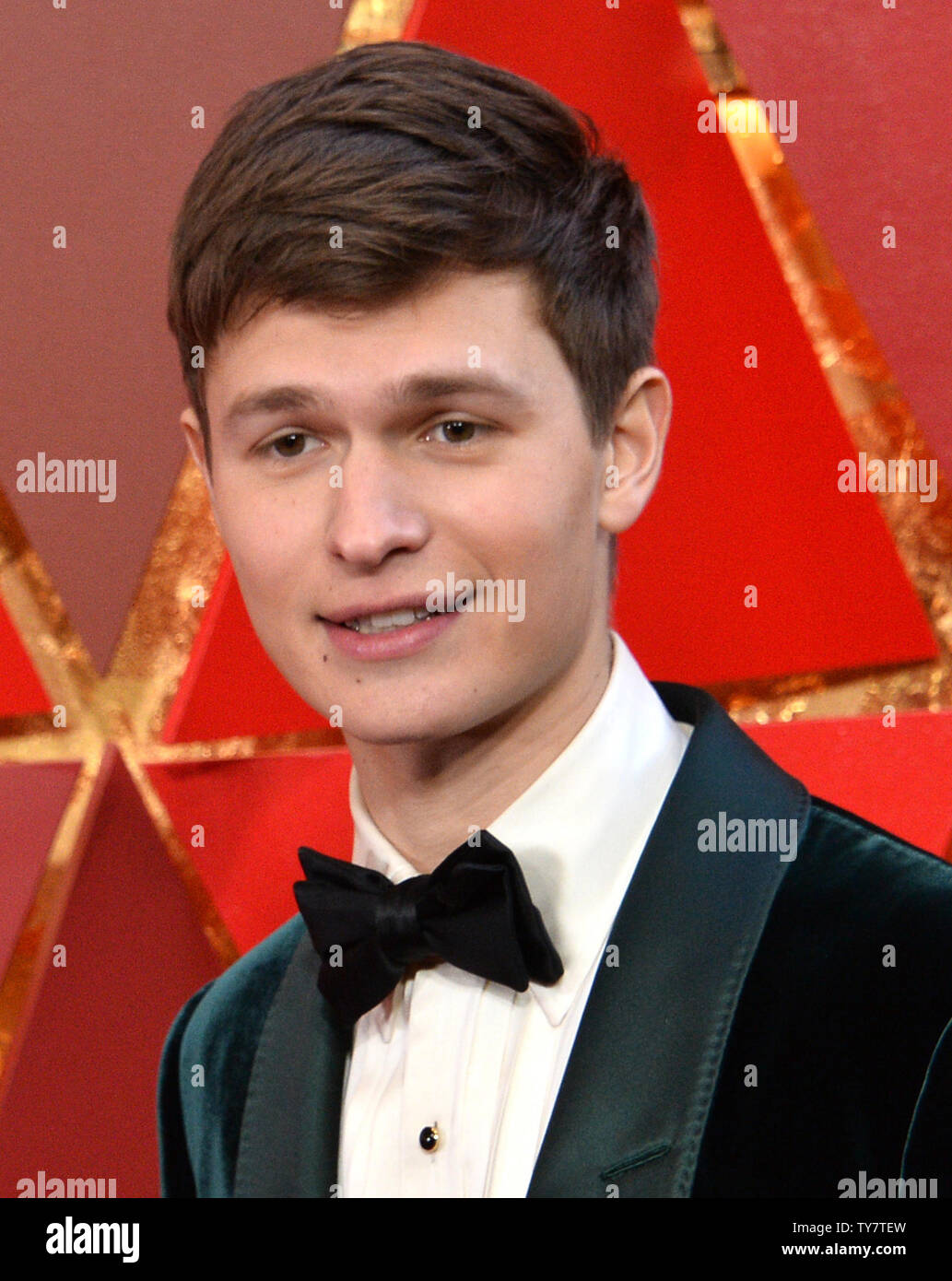Actor Ansel Elgort arrives on the red carpet for the 90th annual ...
