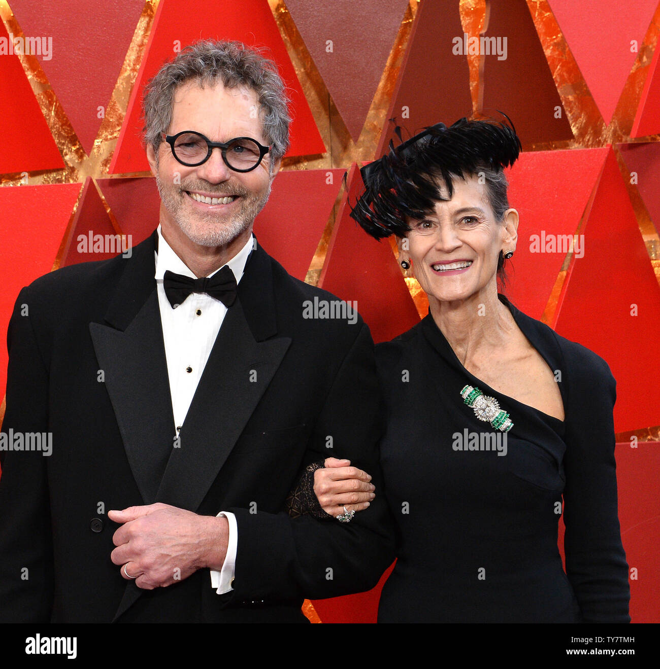 Production designer Dennis Gassner (L) and guest arrive on the red ...