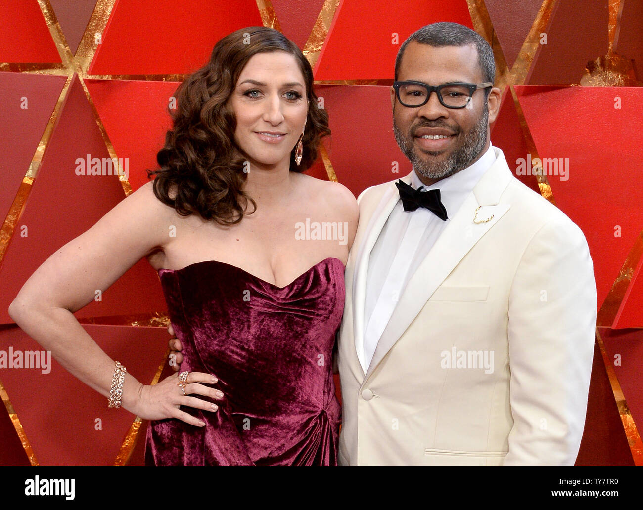 Actor Chelsea Peretti (L) and director Jordan Peele arrive on the red ...