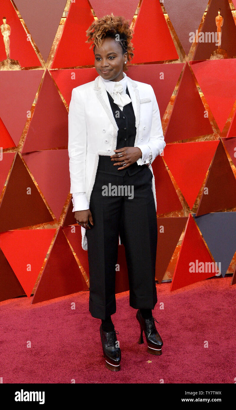 Screenwriter Dee Rees arrives on the red carpet for the 90th annual ...