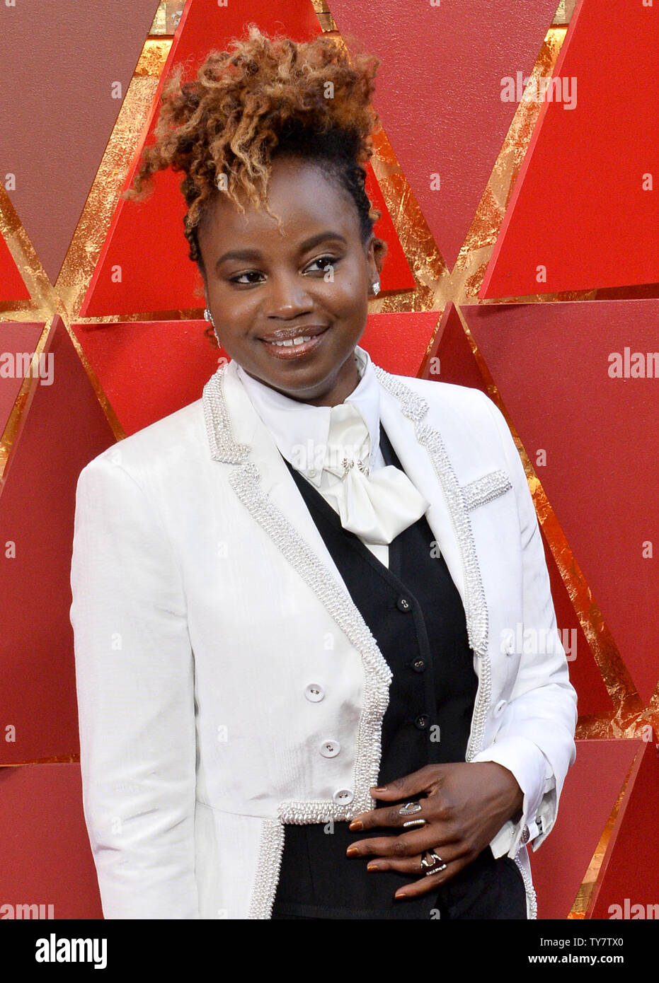 Screenwriter Dee Rees arrives on the red carpet for the 90th annual ...