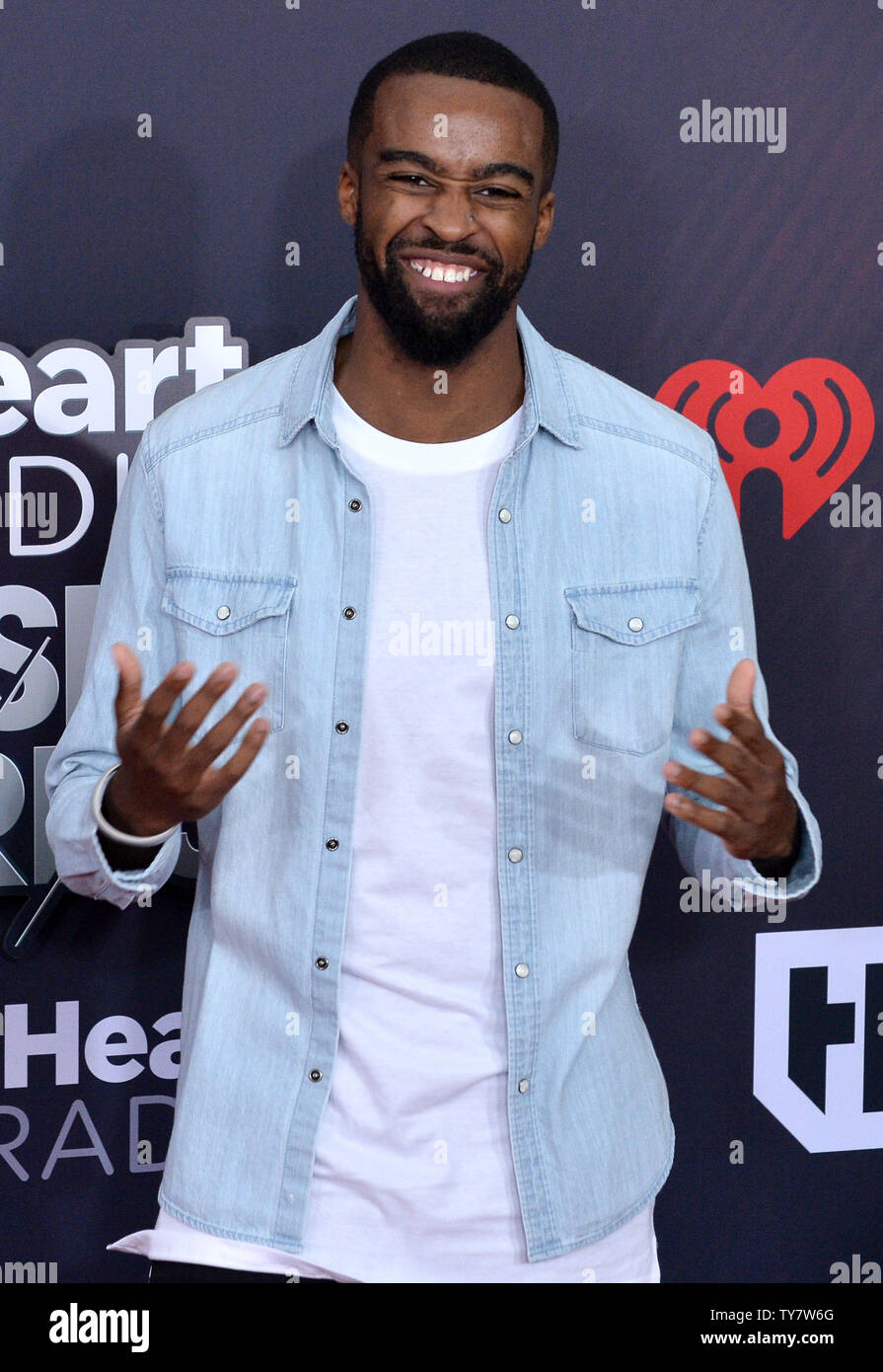 Landon Moss arrives for the iHeartRadio Music Awards at The Forum in ...