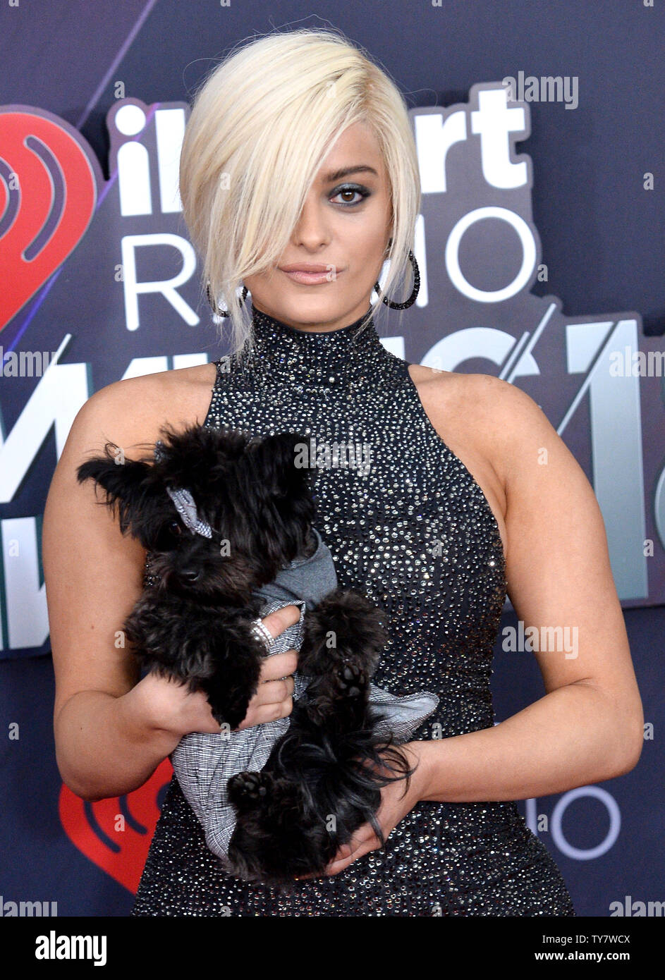 Singer Bebe Rexha arrives for the iHeartRadio Music Awards at The Forum ...